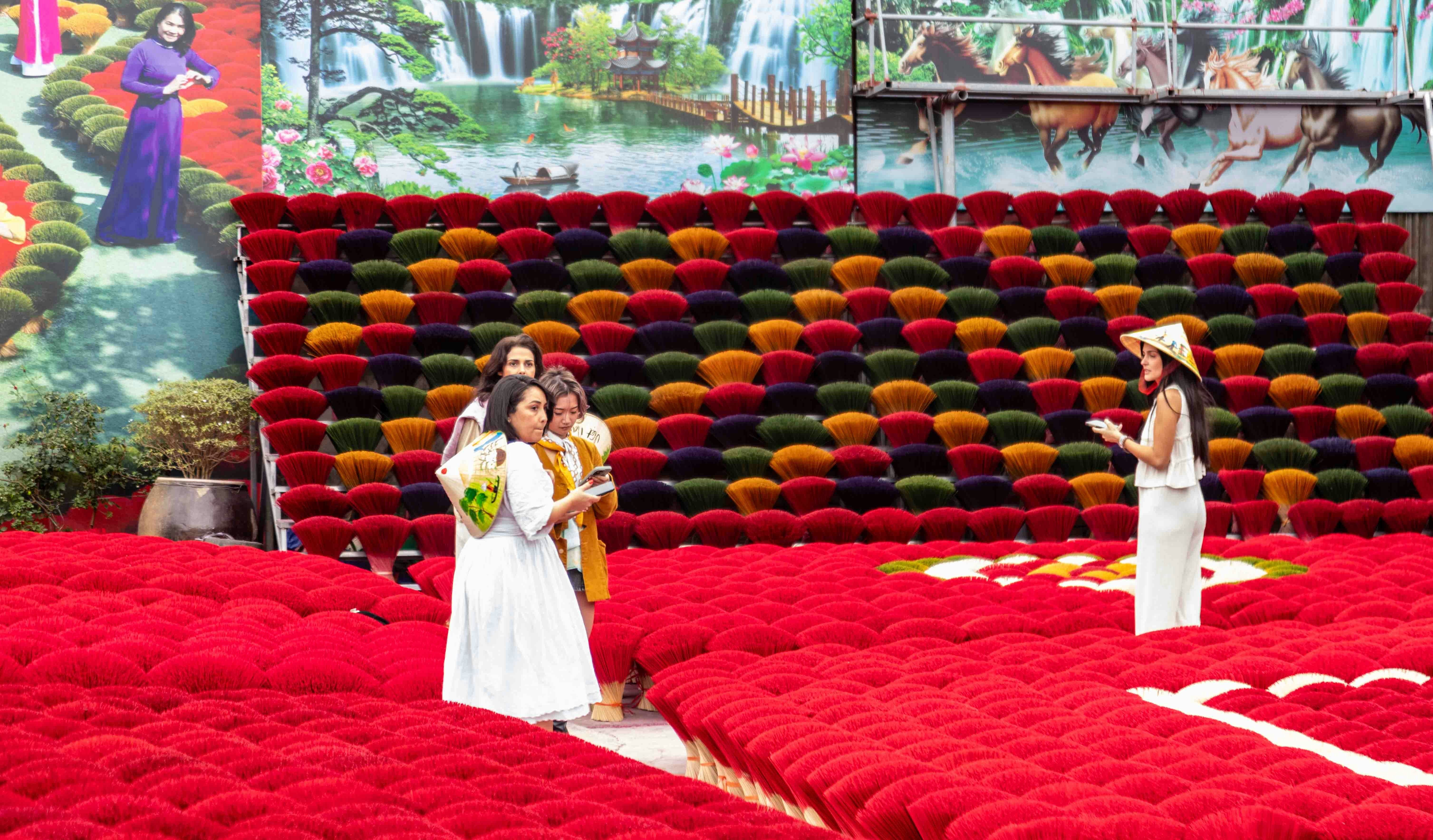 Cosplay of Lovers Beneath a Sea of Scarlet Rows
