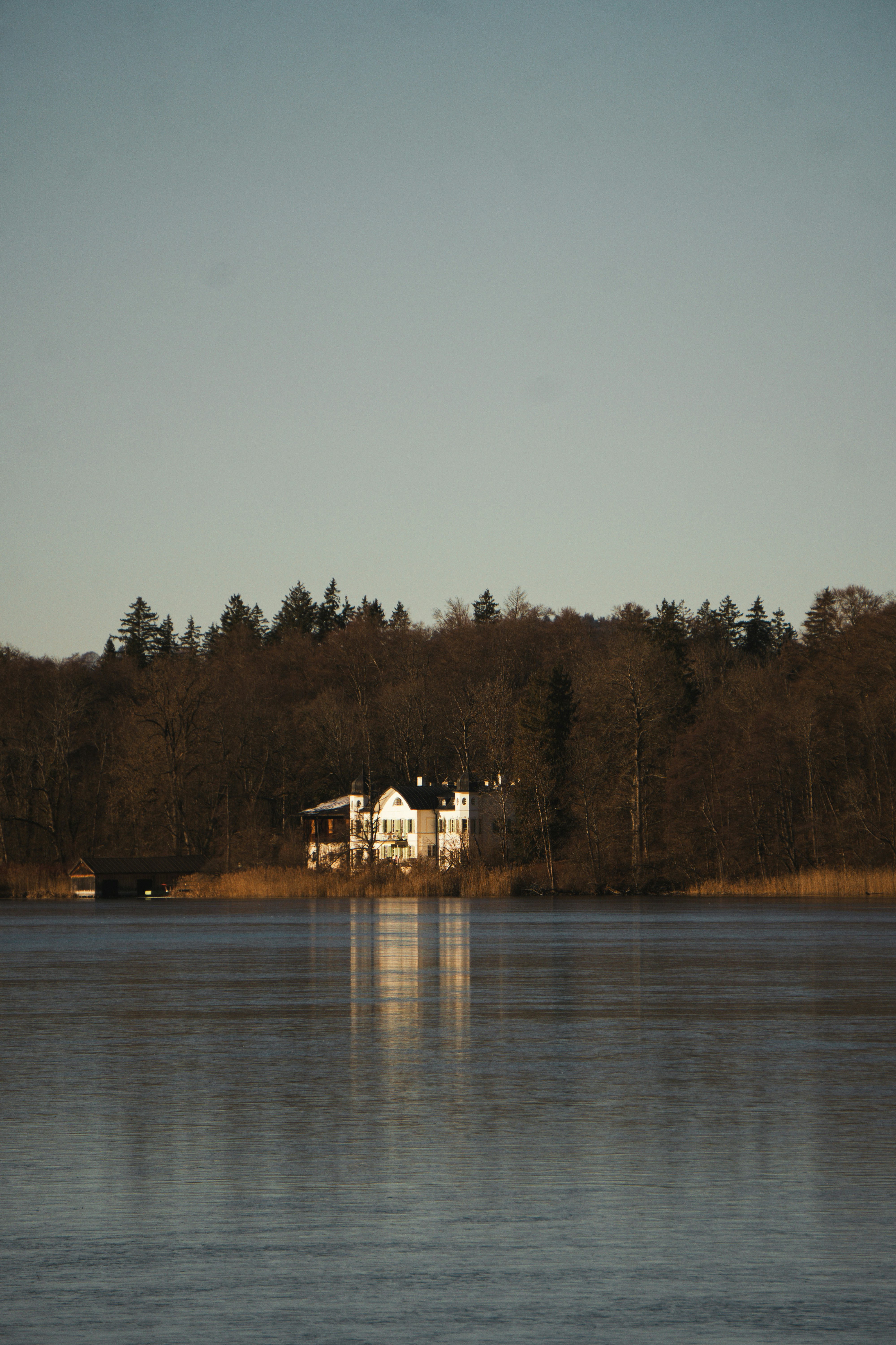 Quiet Lakeside House Amid Autumn Forest
