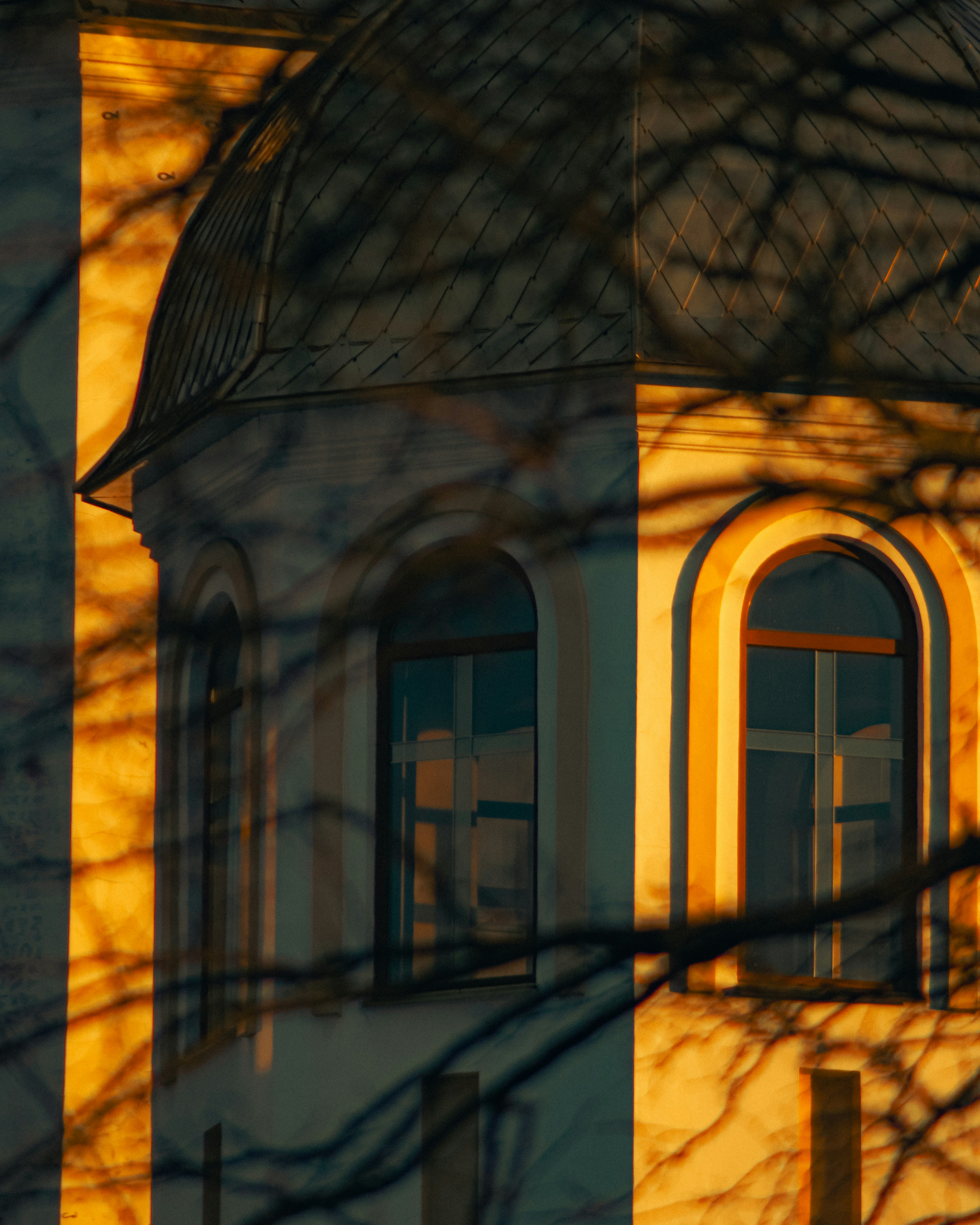 Golden Window Arches in Twilight Glow