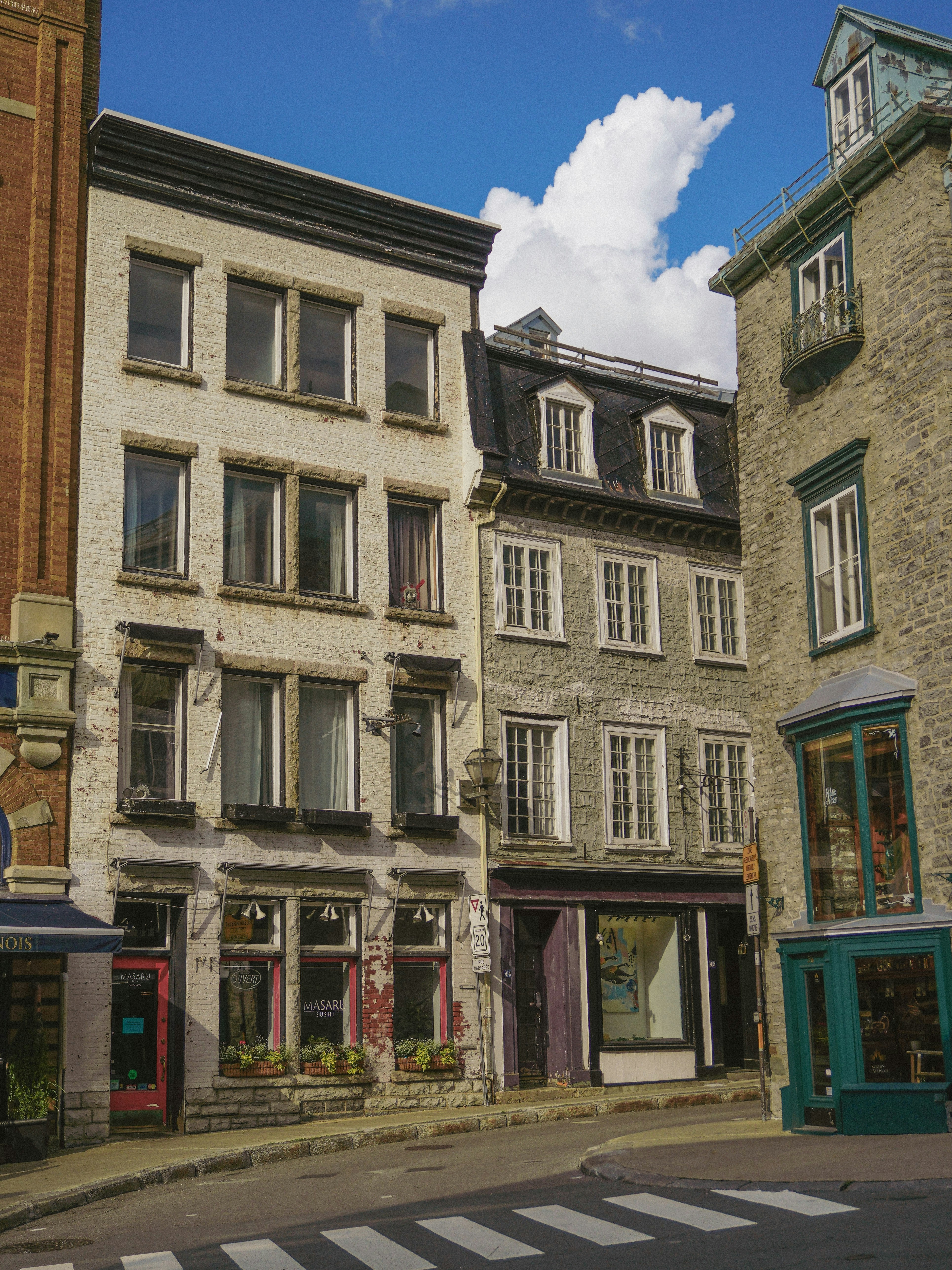 Sunlit Façades and Shopfronts on a Berwyn Street