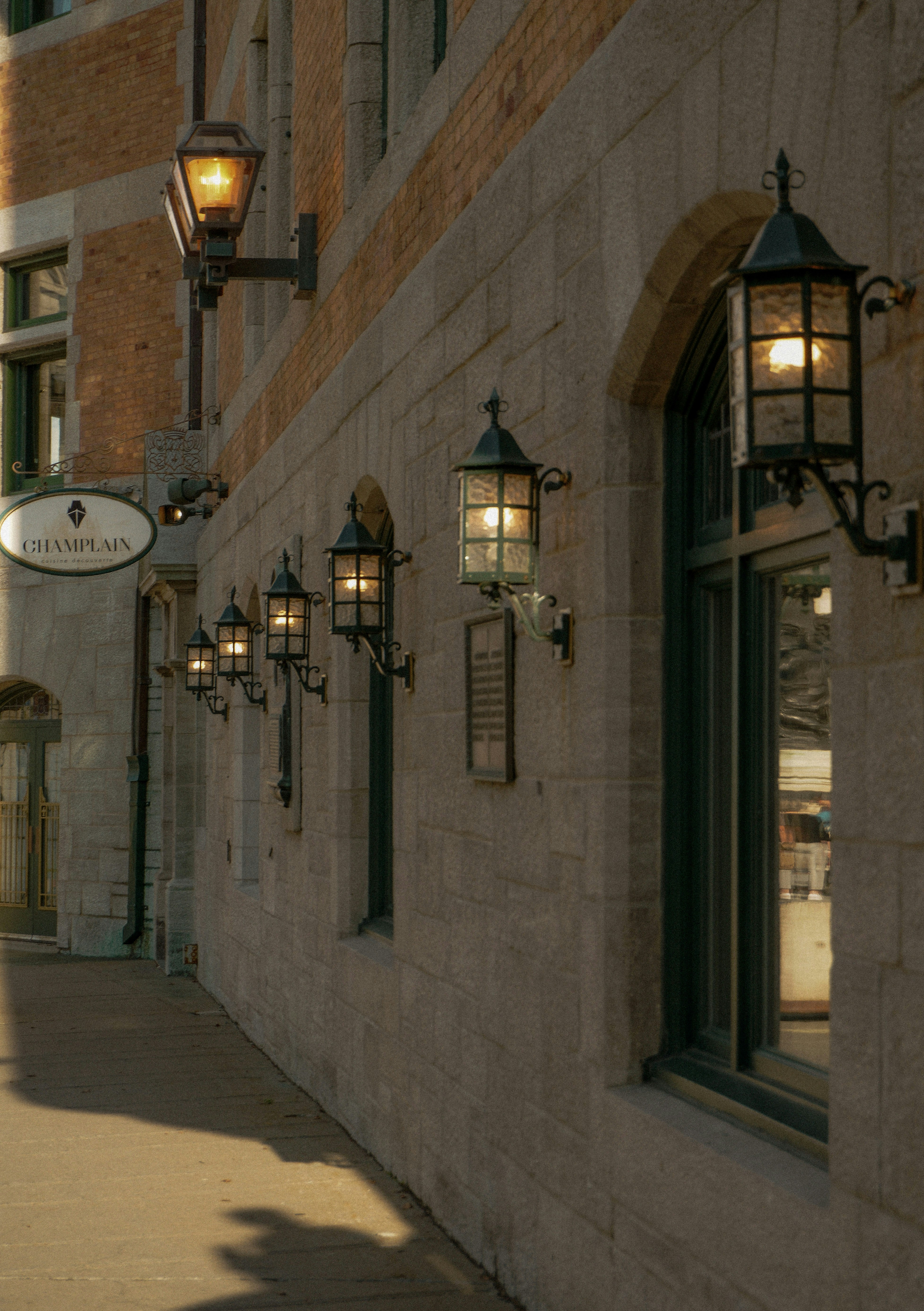 Lantern-lined Facade: Evening Lanterns Along a Stone Street