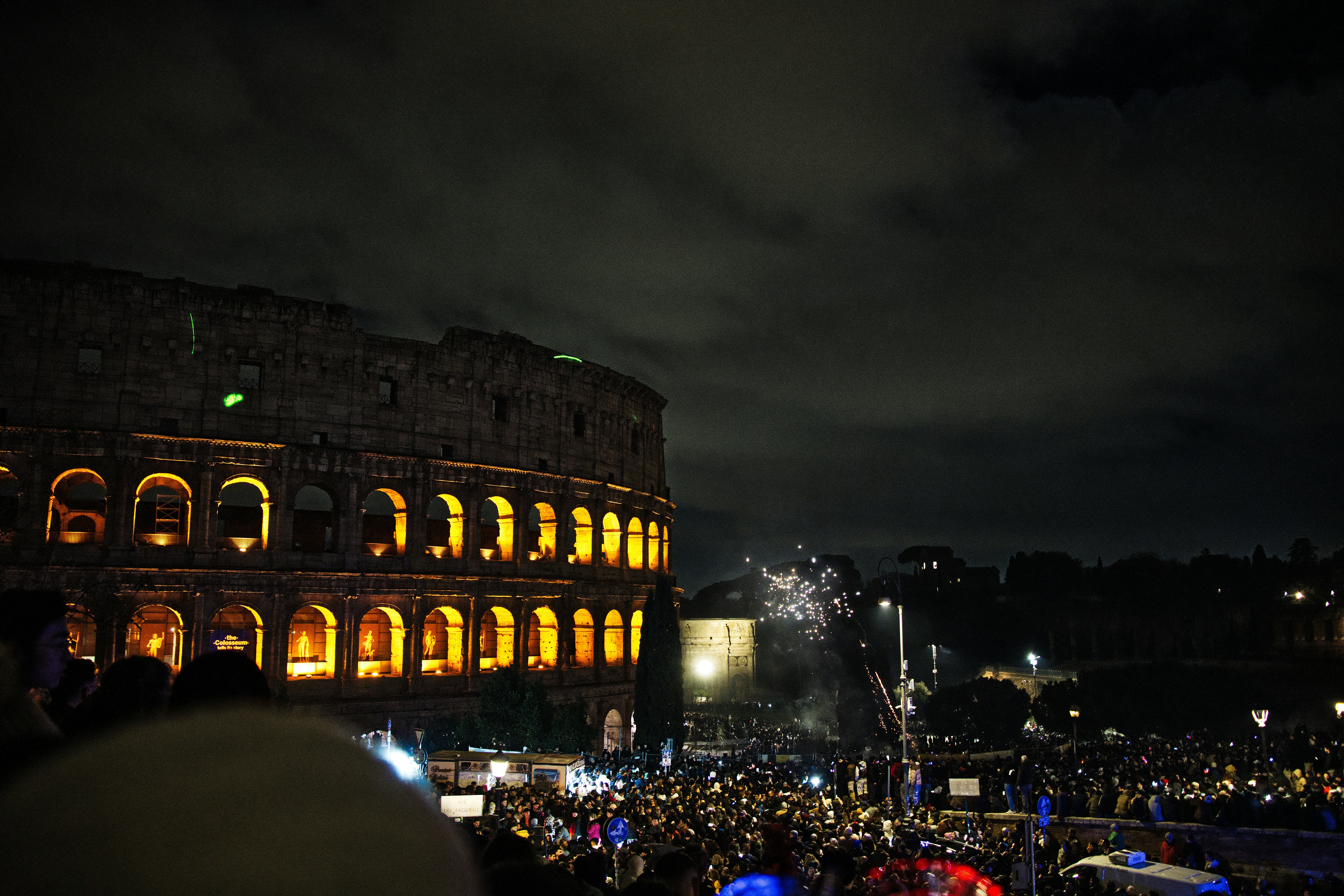 Moonlit Arena: The Colosseum Lit in Golden Night