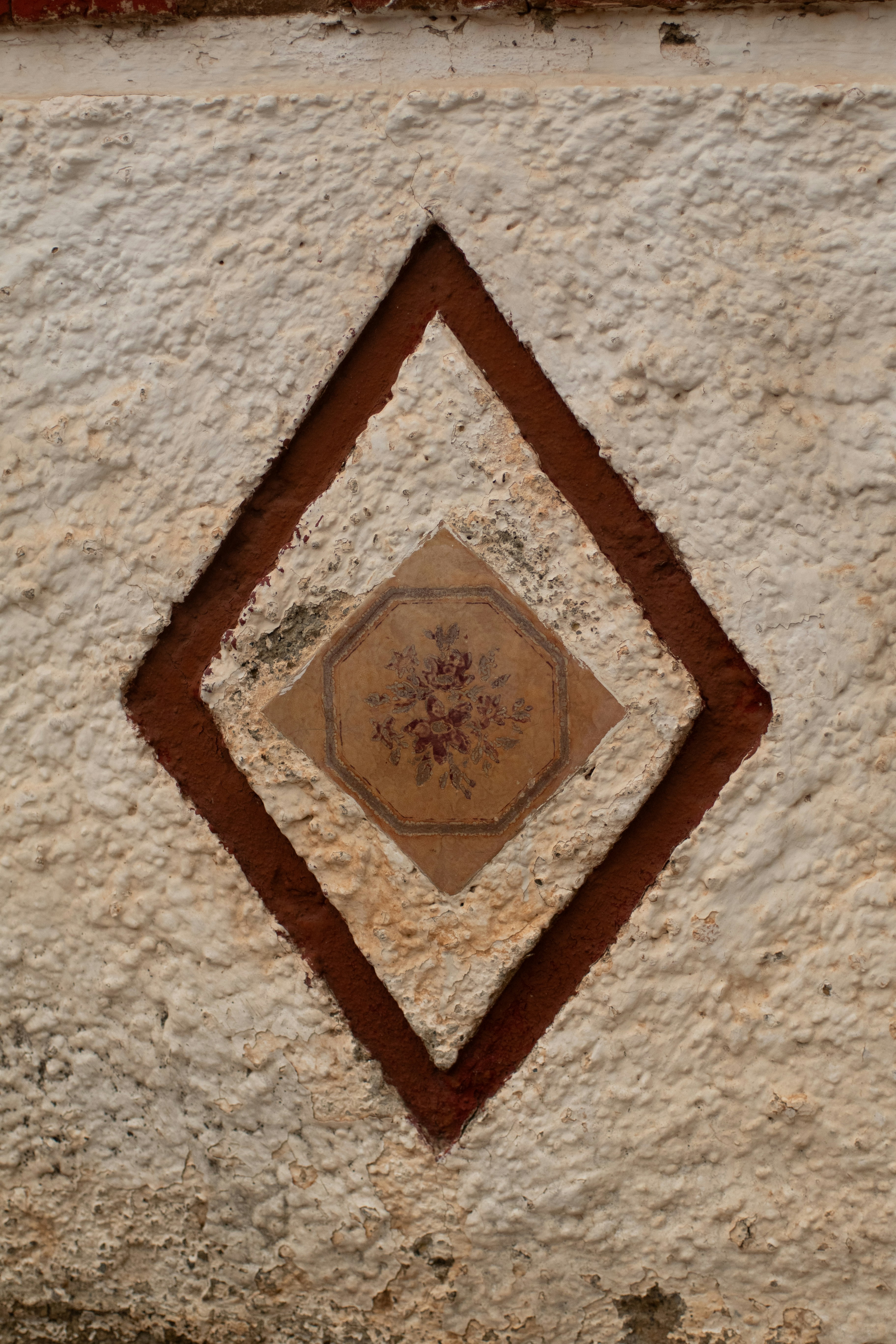 Diamond Mosaic Framed in Weathered Wall