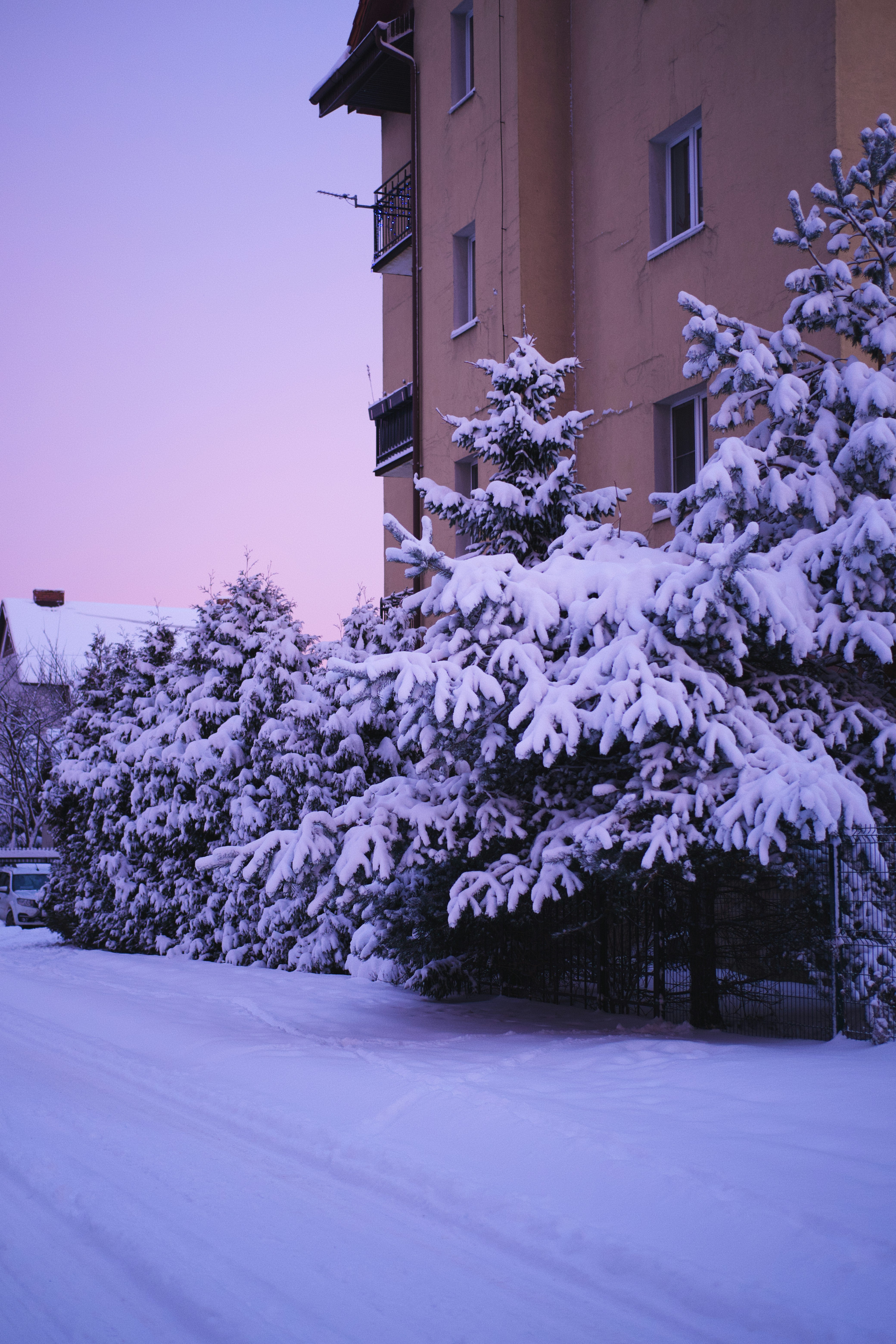 Snowy Balcony Toward a Purple Sunset