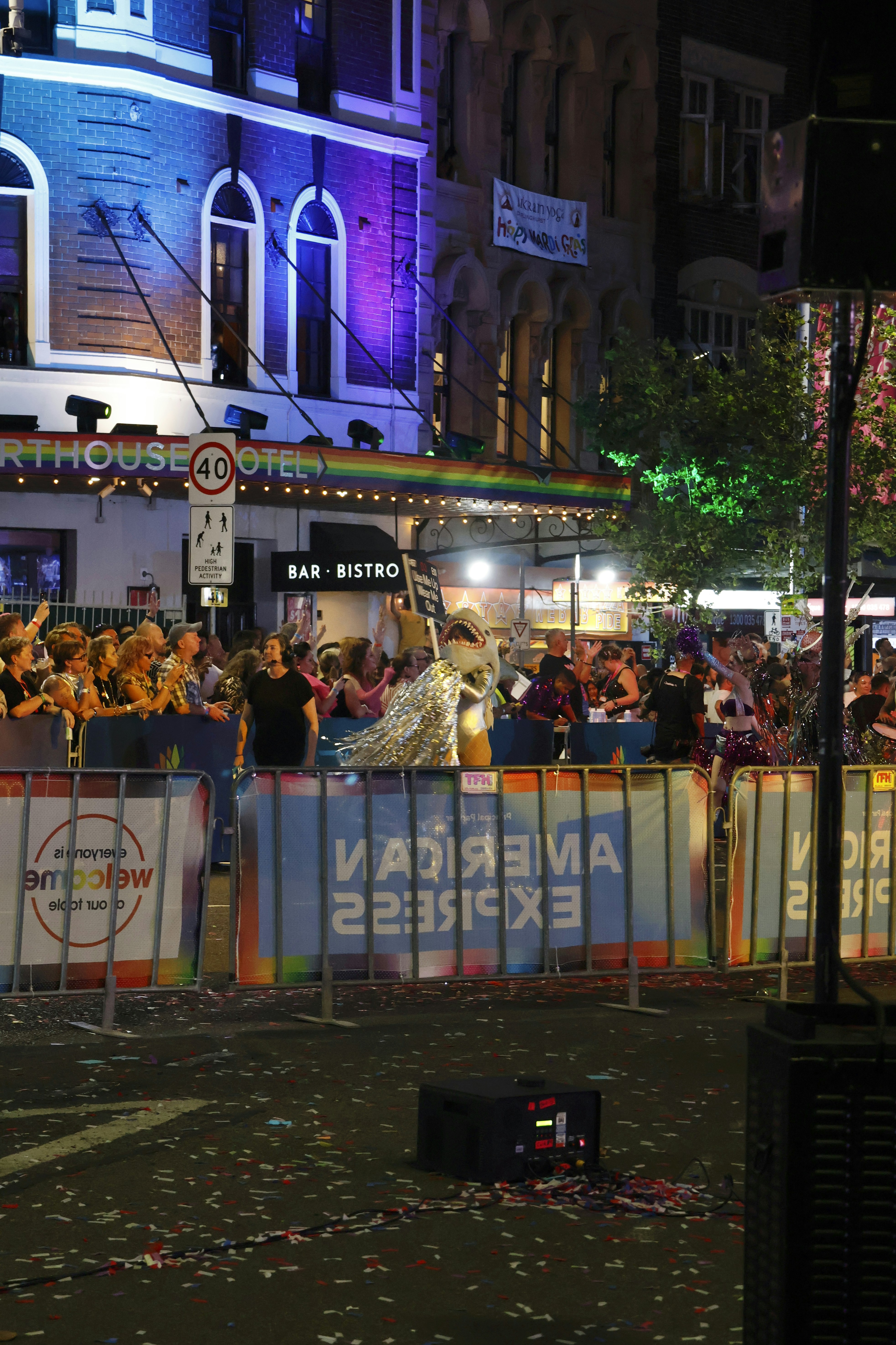 Shimmering Shark Parade: Neon-lit Street Carnival under Night Skies
