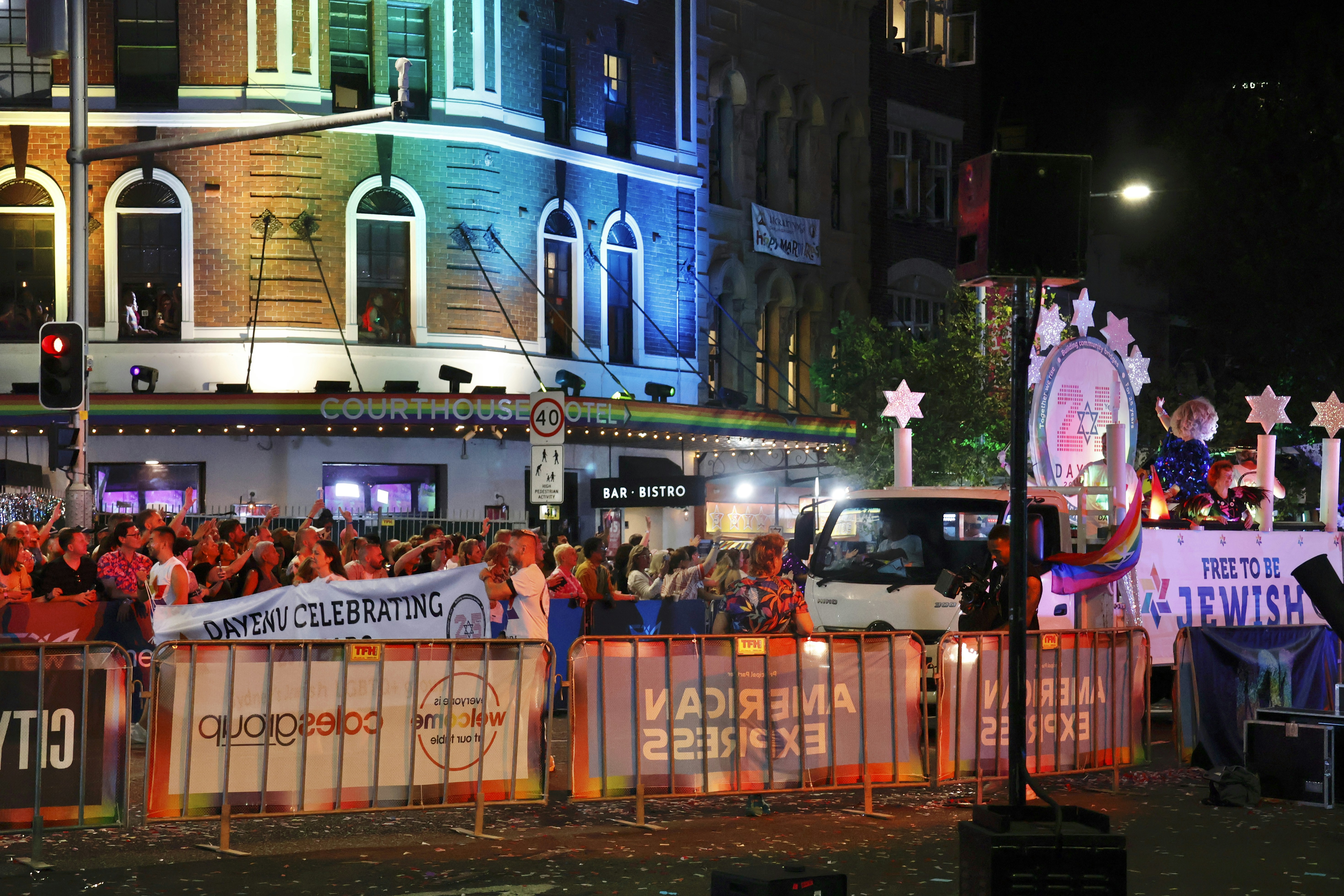 Neon Celebration: A Night of Colorful Spectacle on the Historic Street
