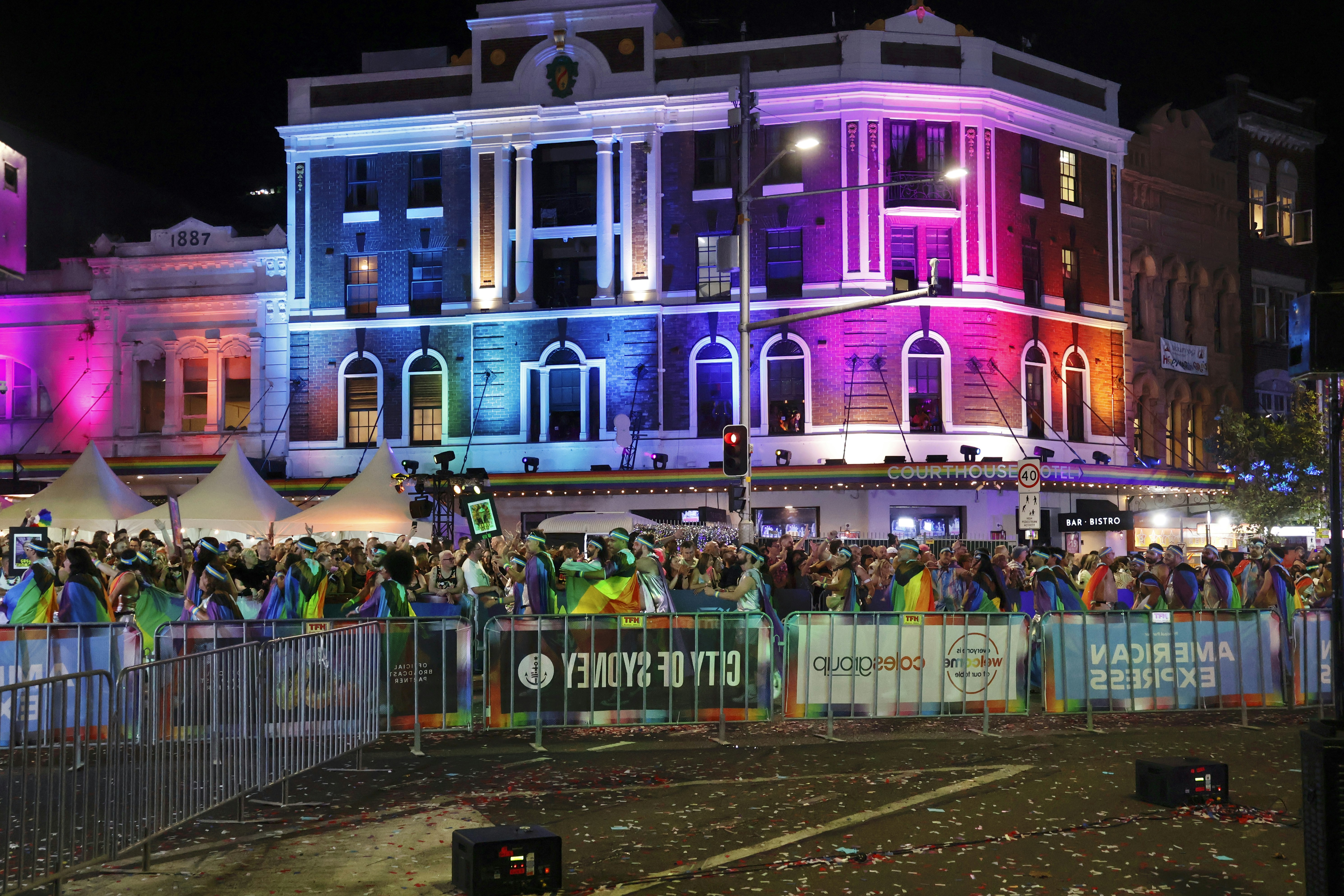 Neon Facade: Night Festival on a Colorful Townfront