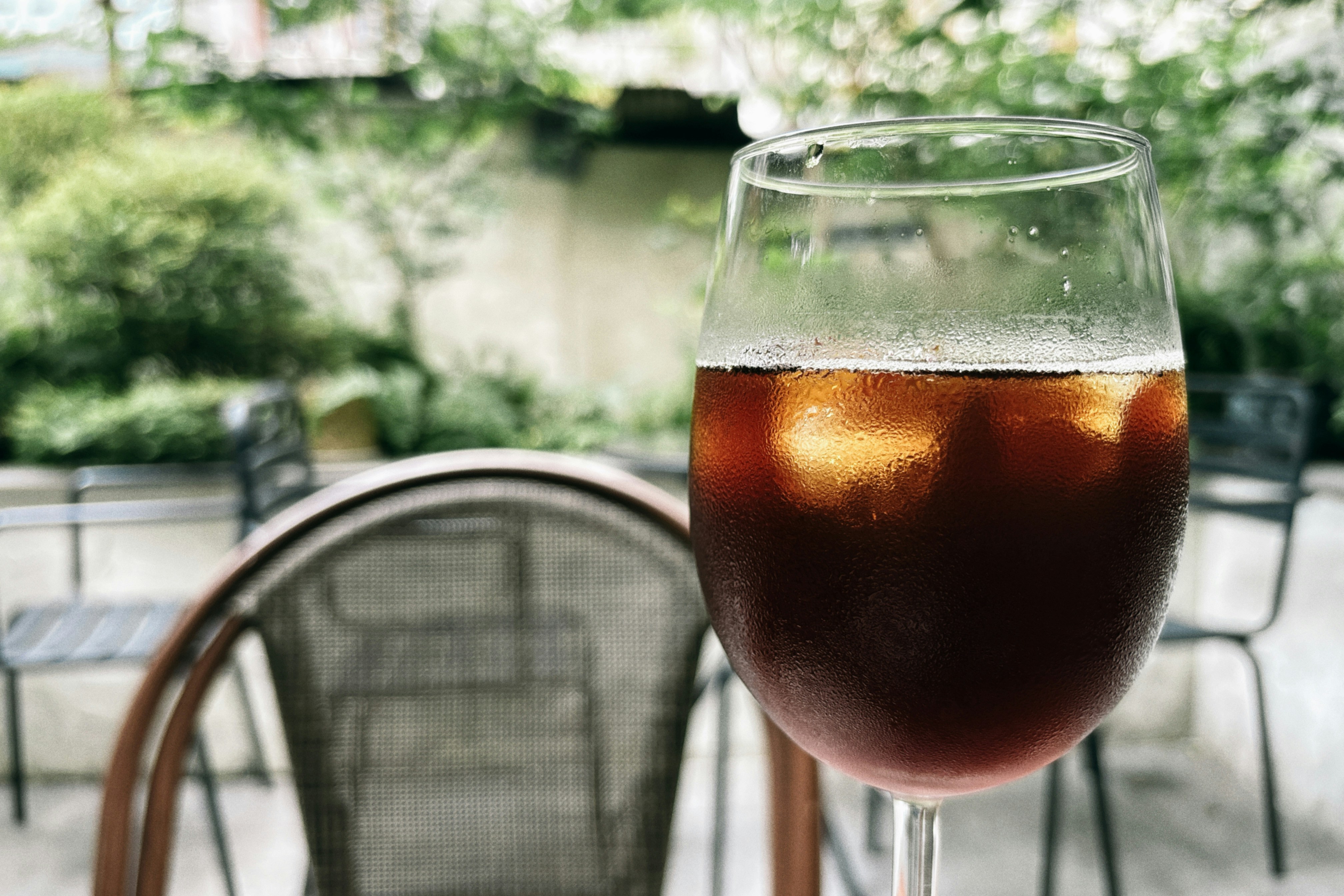 A Glass of Evening Calm on a Café Terrace