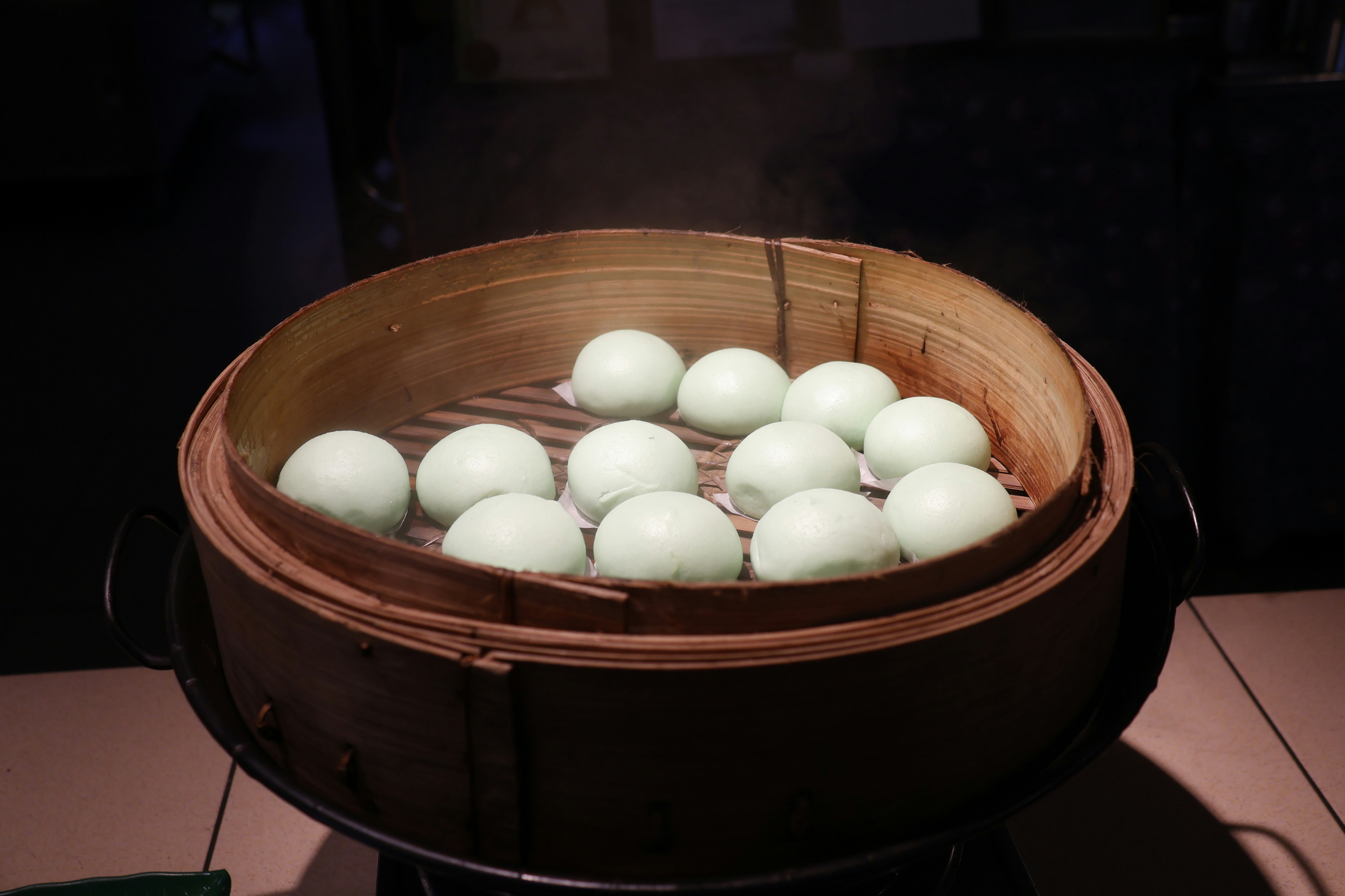 Steamed Lantern: A Basket of Softly Lit Ecru Eggs