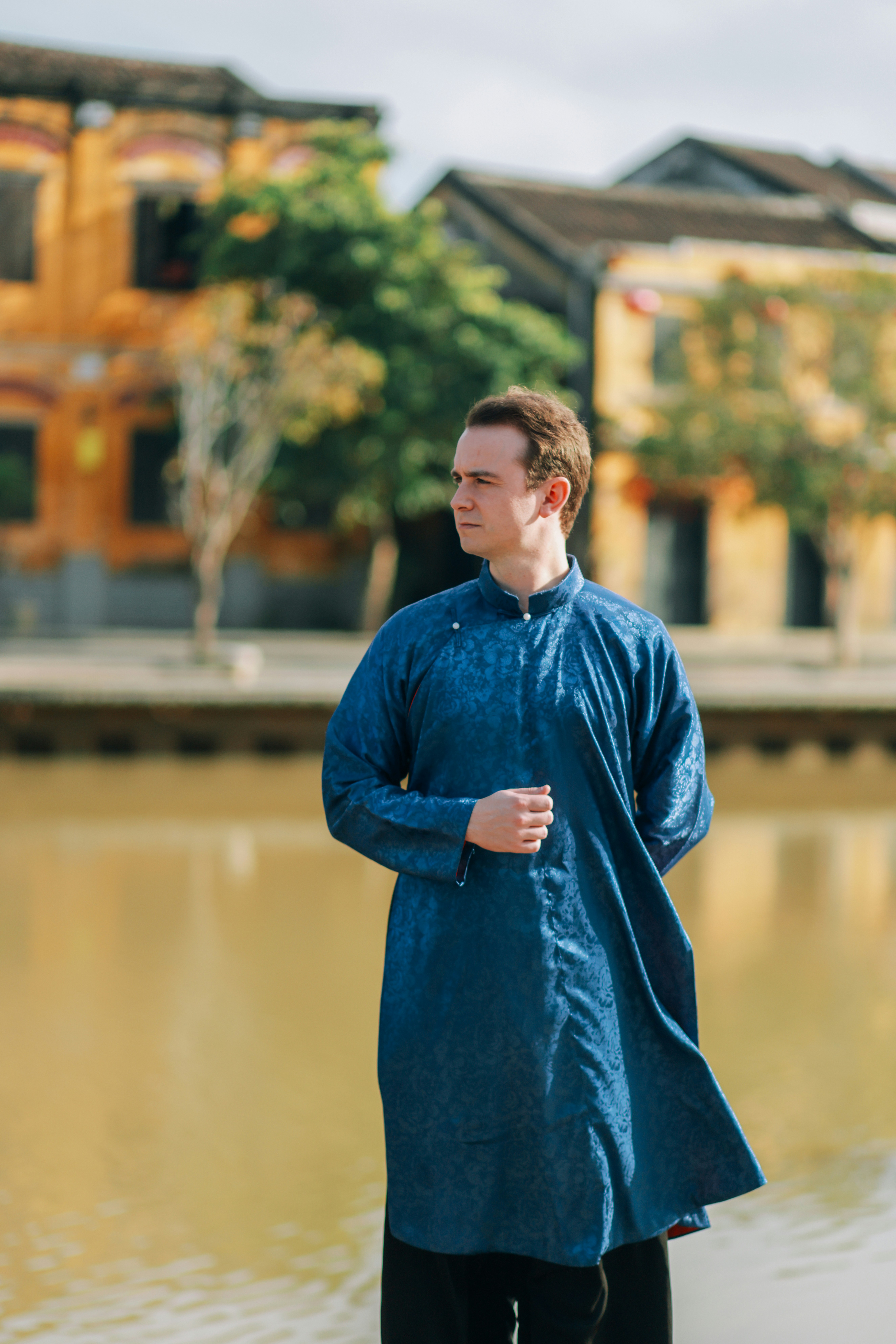 Blue kurta beneath a sunlit courtyard