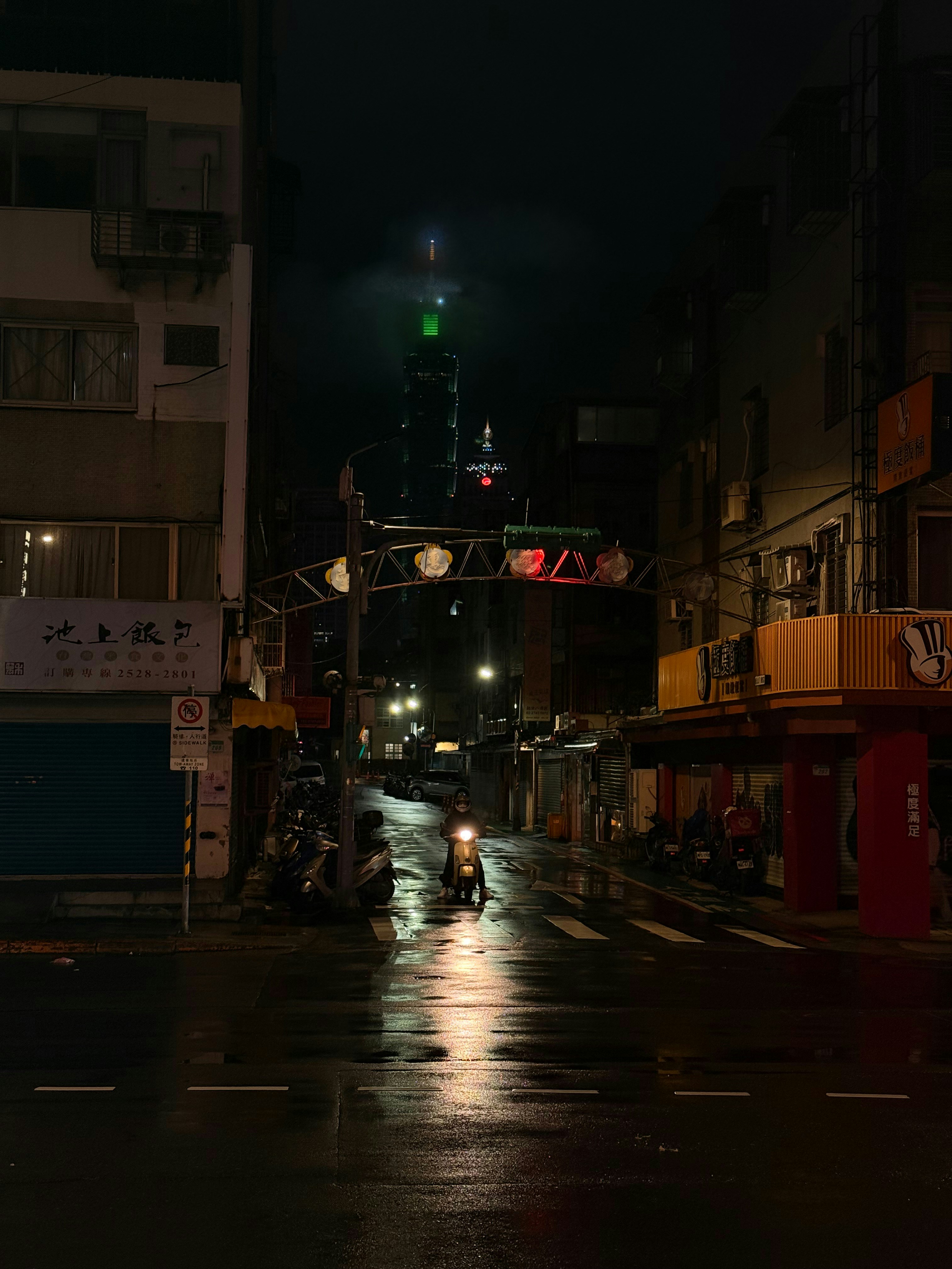 Night Street Symphony: Neon Lanterns and a Lone Scooter