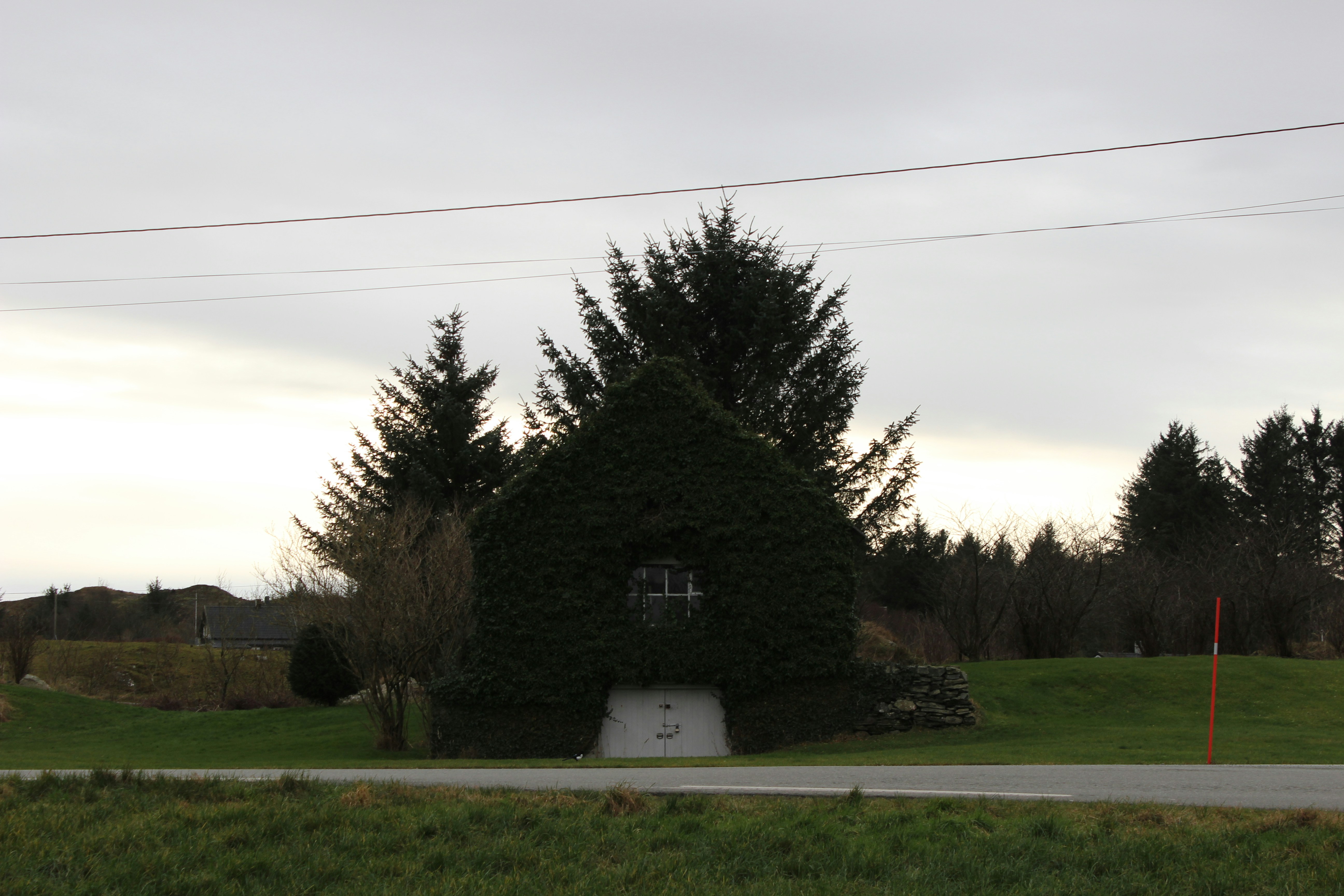 Conical Garden House Nestled Behind a Quiet Country Road