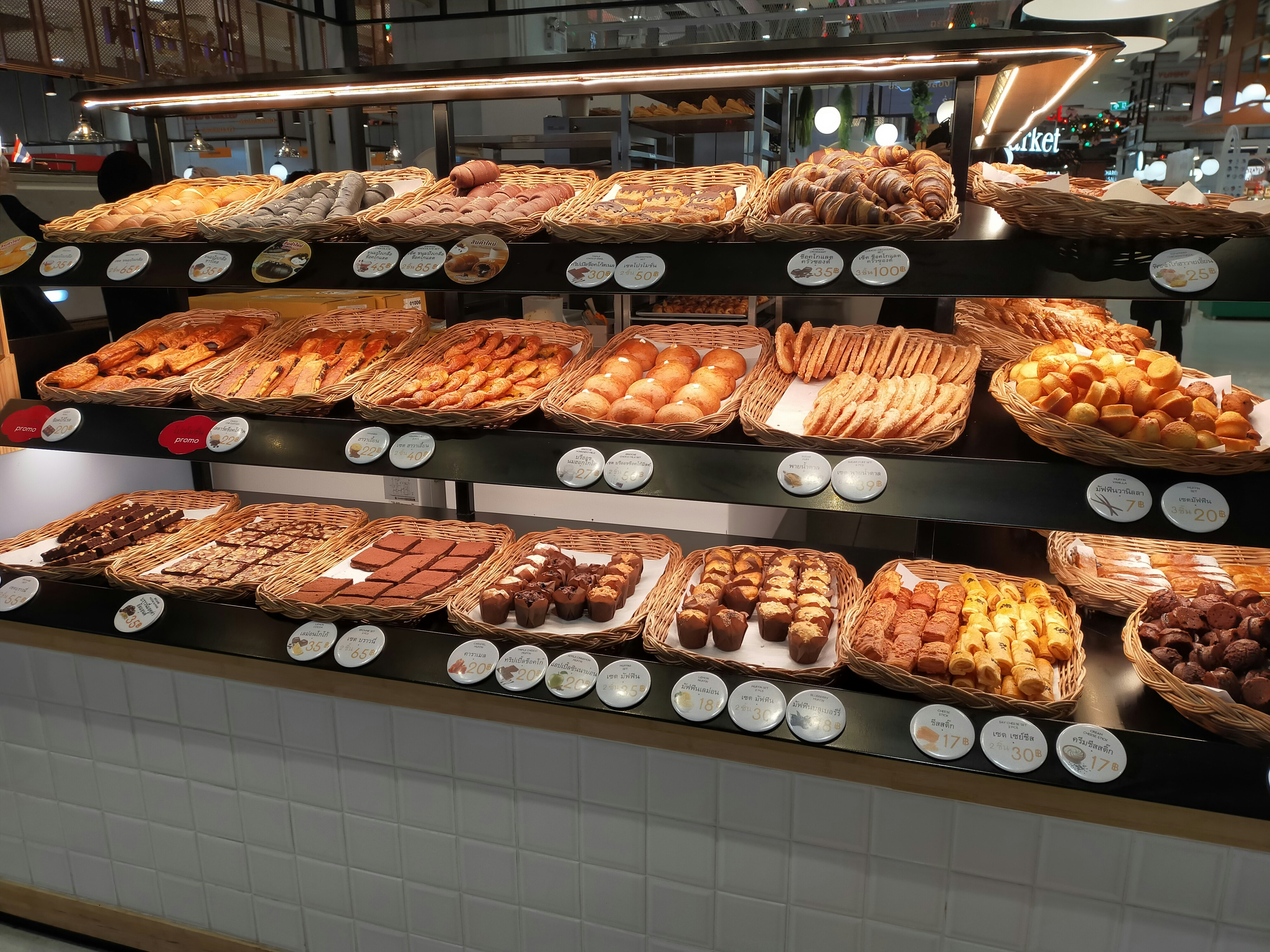 Display of various baked goods and pastries.