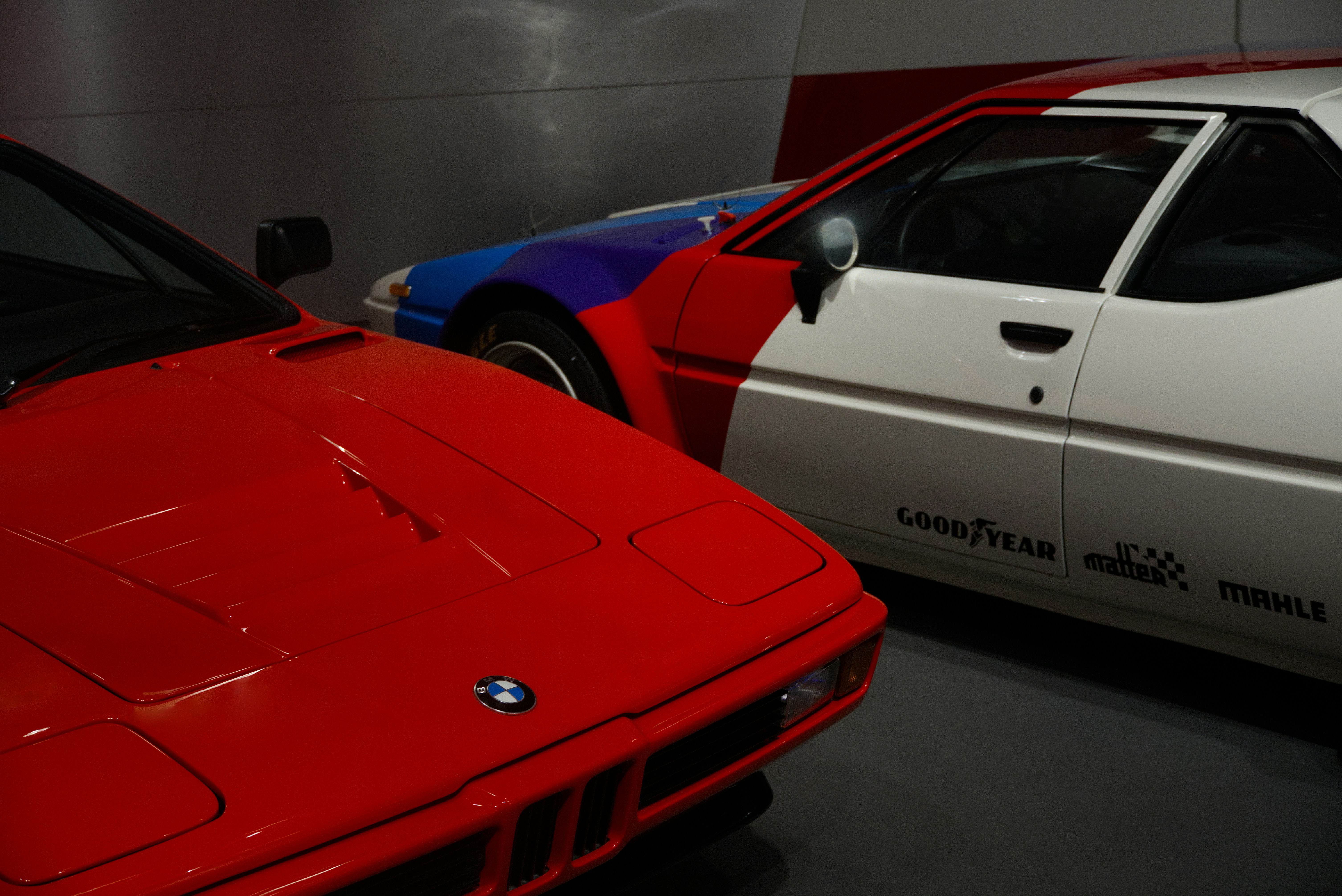 Red Corvette in Workshop: Reflections and Rivalry
