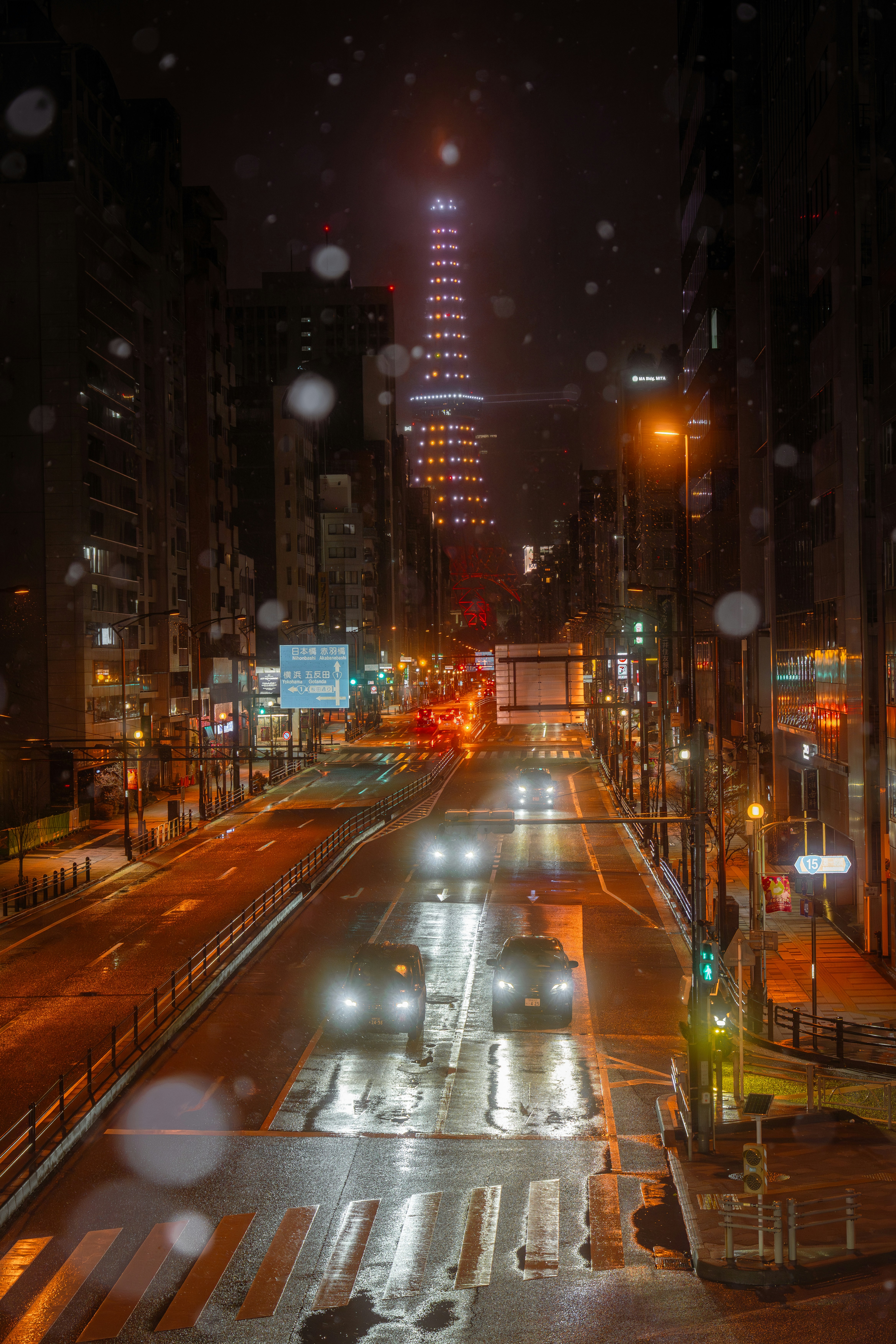 Neon Rain over an Urban Spine: Night Drive Through a Glowing City