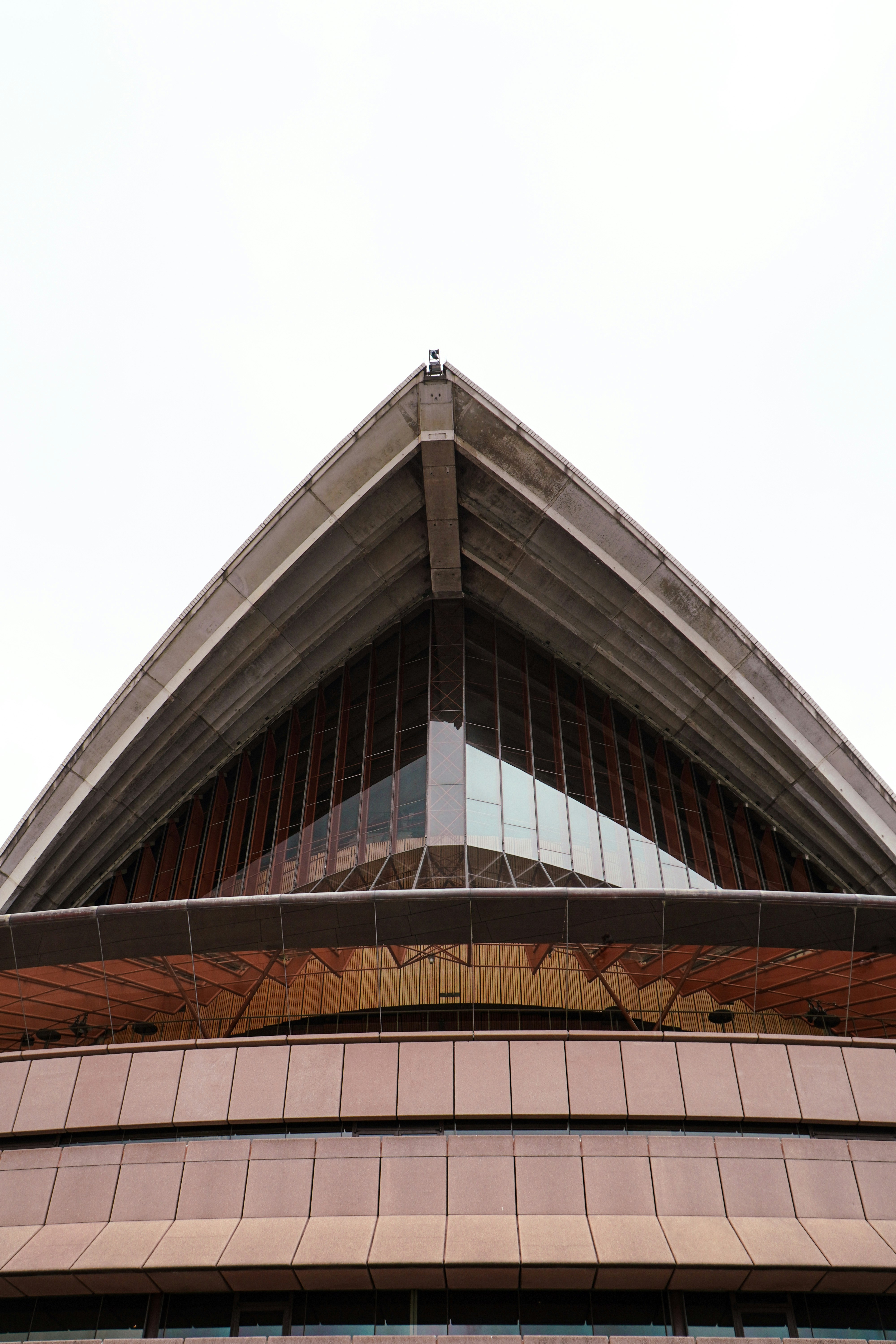 Architectural Wing: The Triangular Peak of Modern Steel and Glass