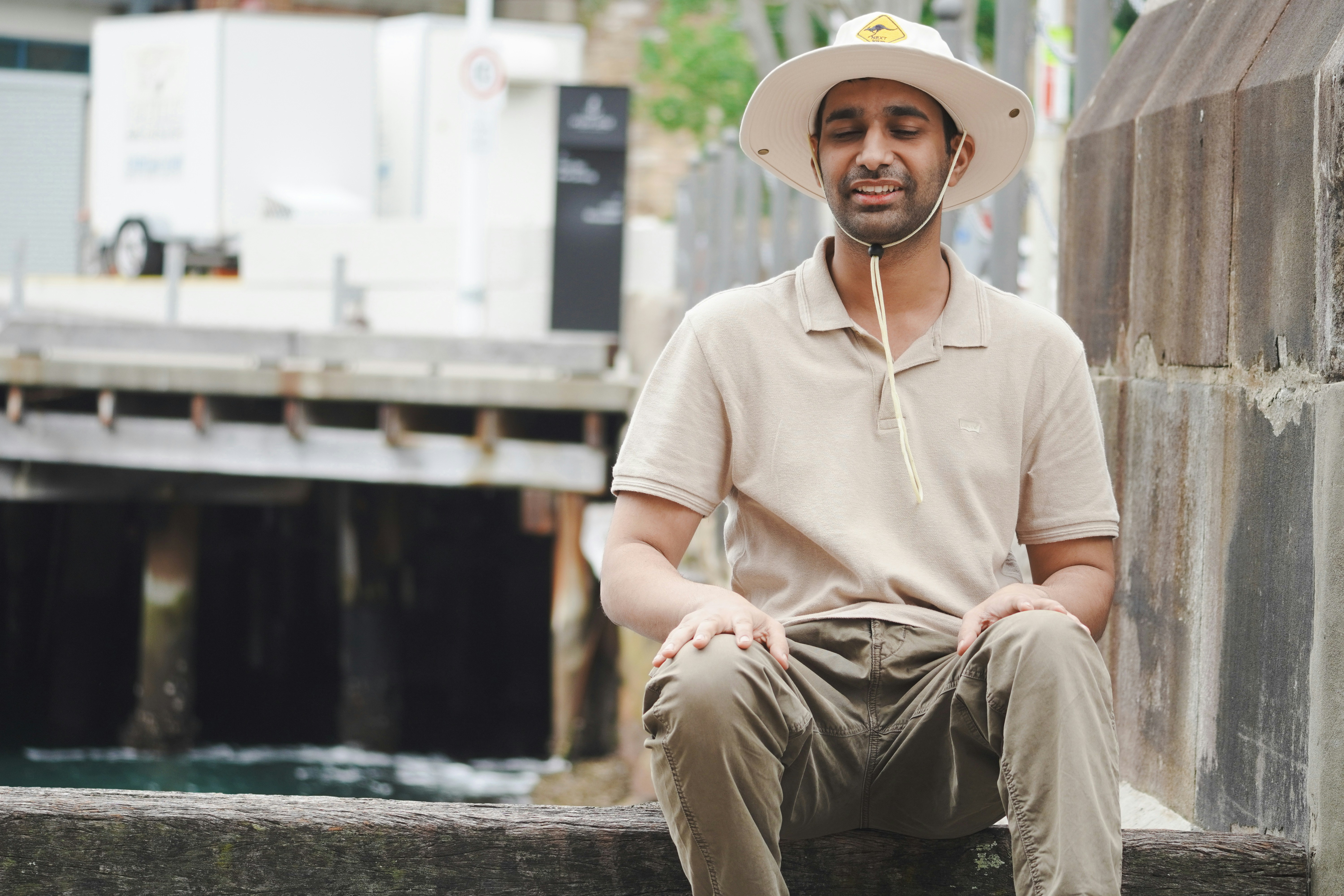 Seated in the Docks: Quiet Confidence by the Water