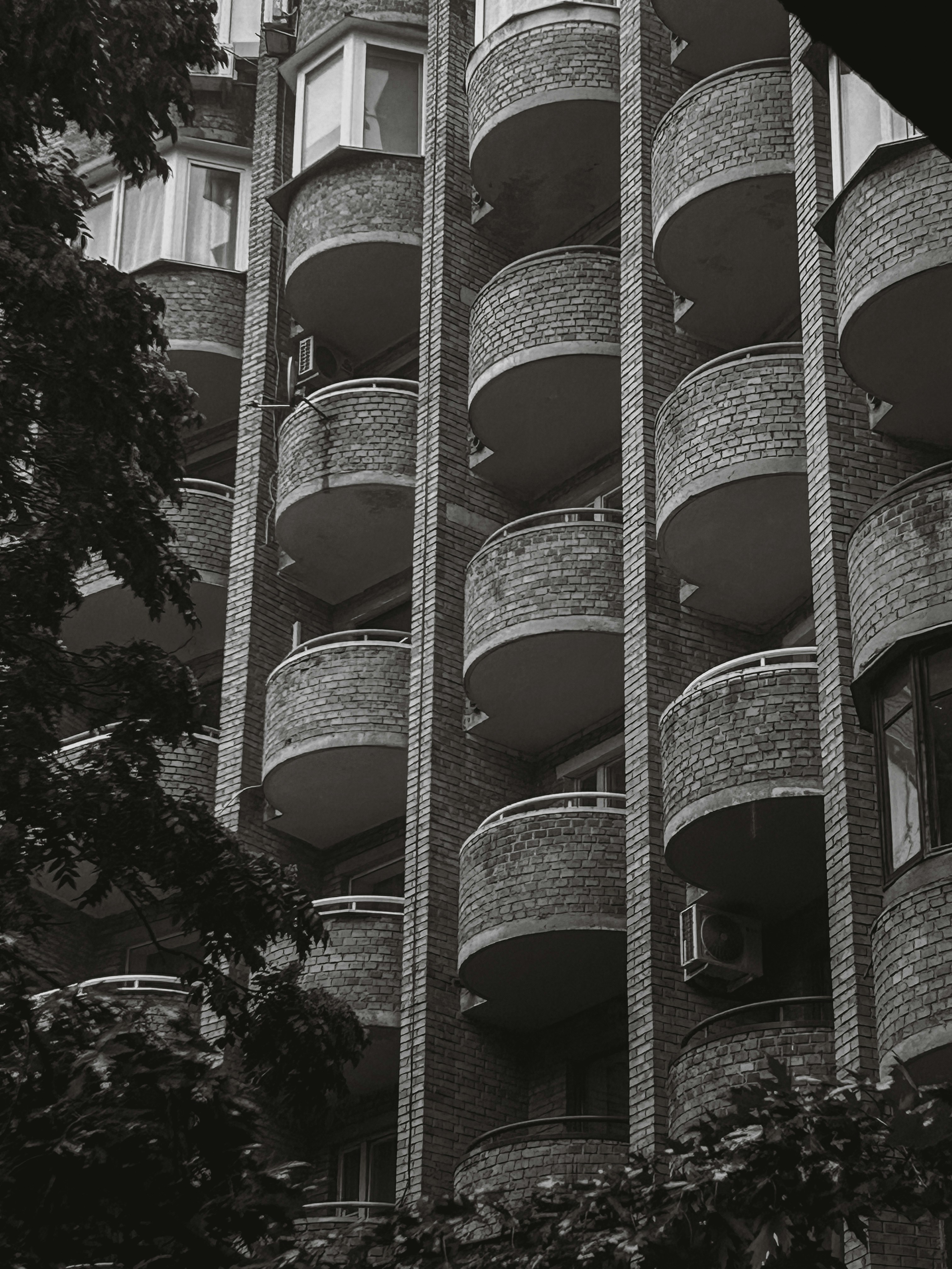 Brutalist Echo: Repeating Balconies Carved in Brick