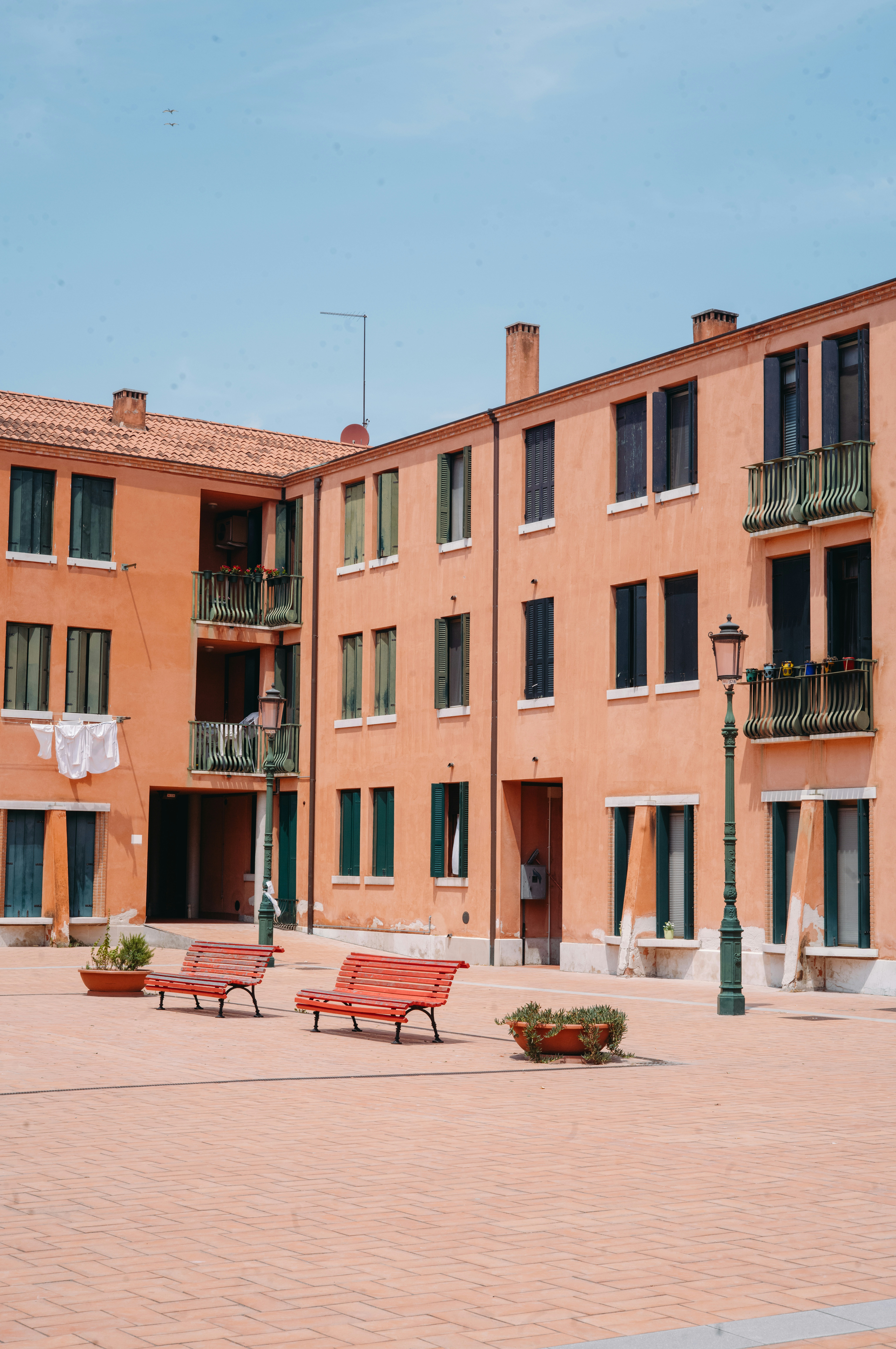 Terracotta Courtyard: Quiet Geometry of Sunset-Soft Facades