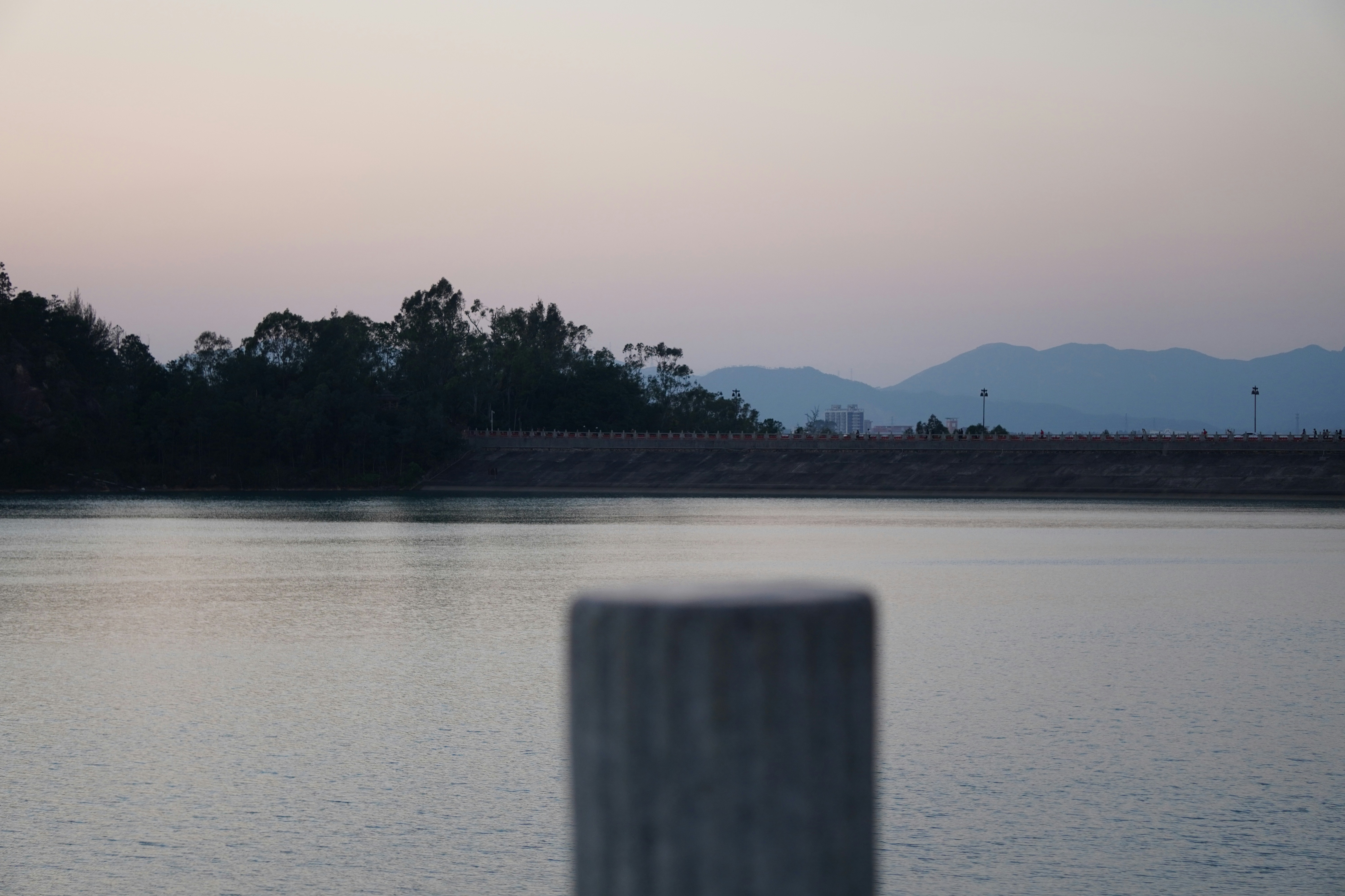 Blurred Post at the Water’s Edge