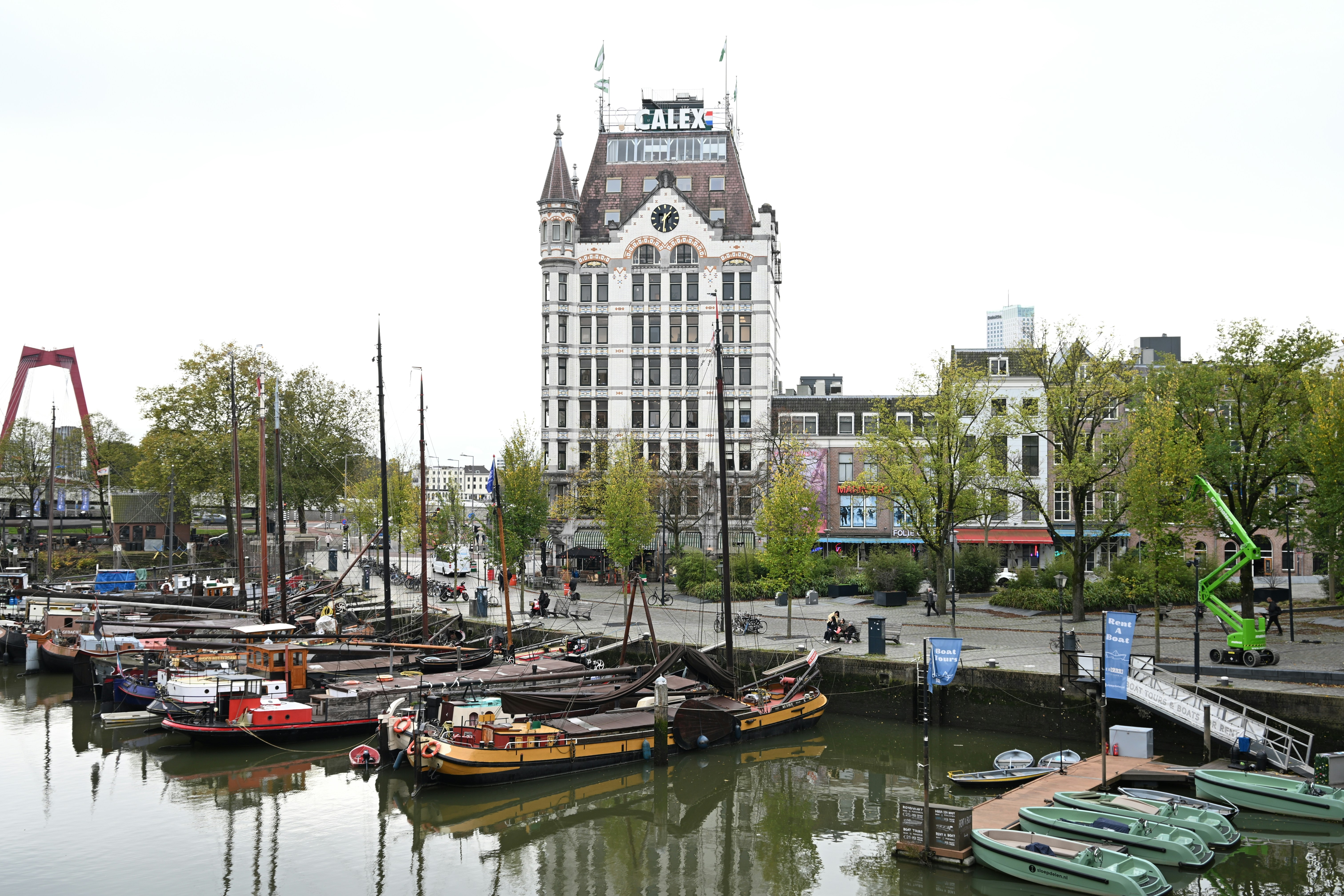 Harbor Belle: Boats, Historic Building, and Reflections by the River