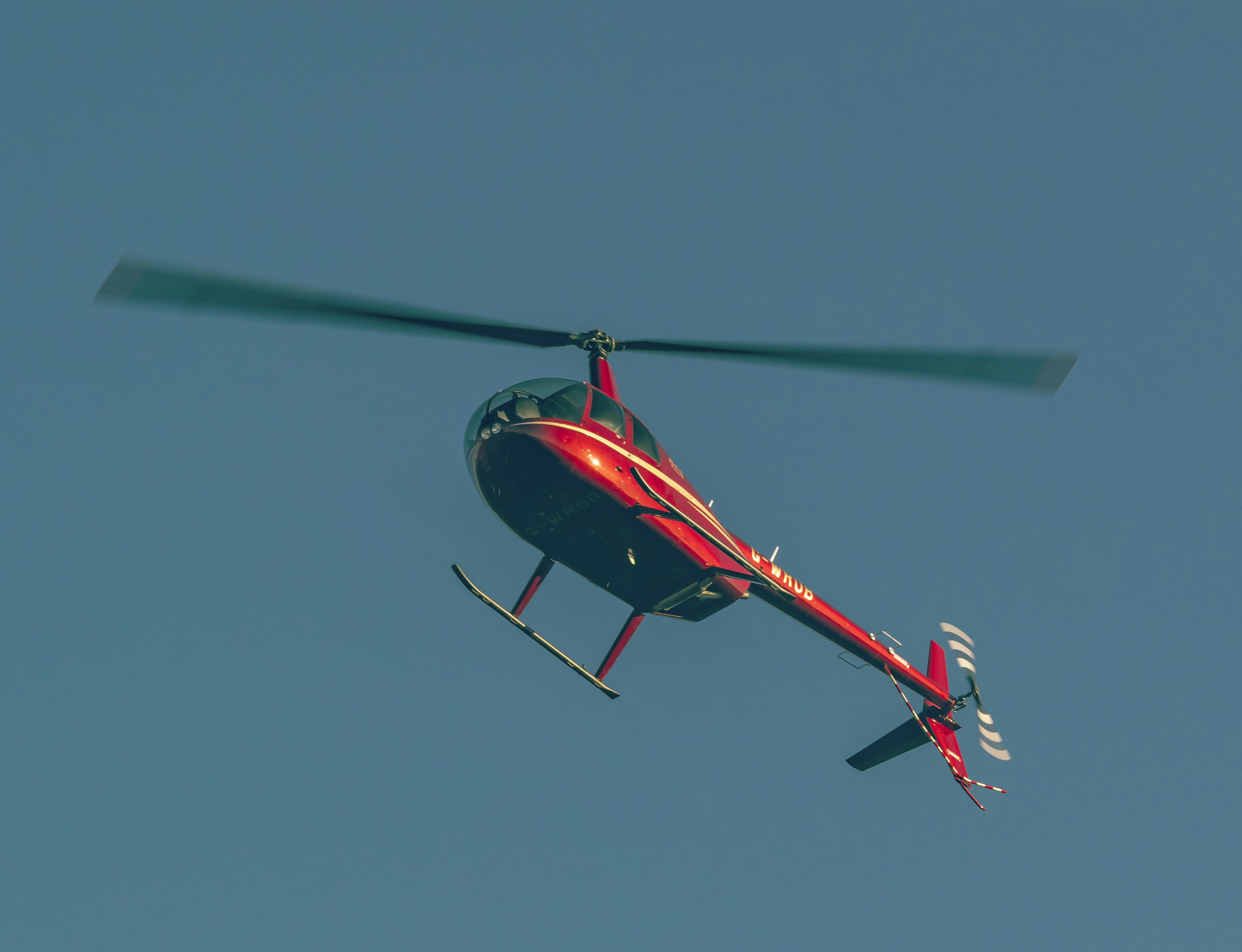 Red Agility in the Sky: A Helicopter in Flight