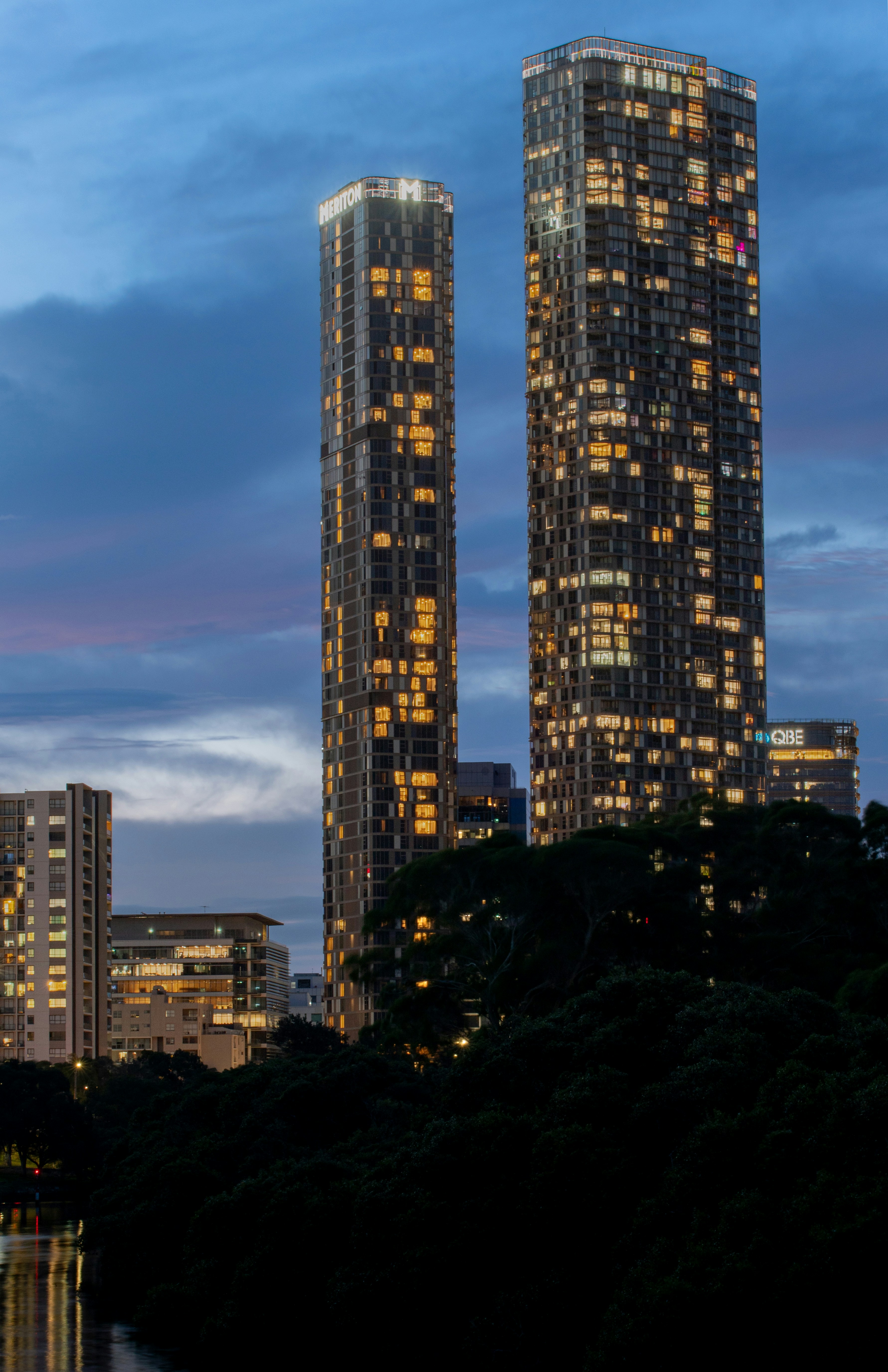 Twilight Giants: Twin Towers Rise Over the River Bend