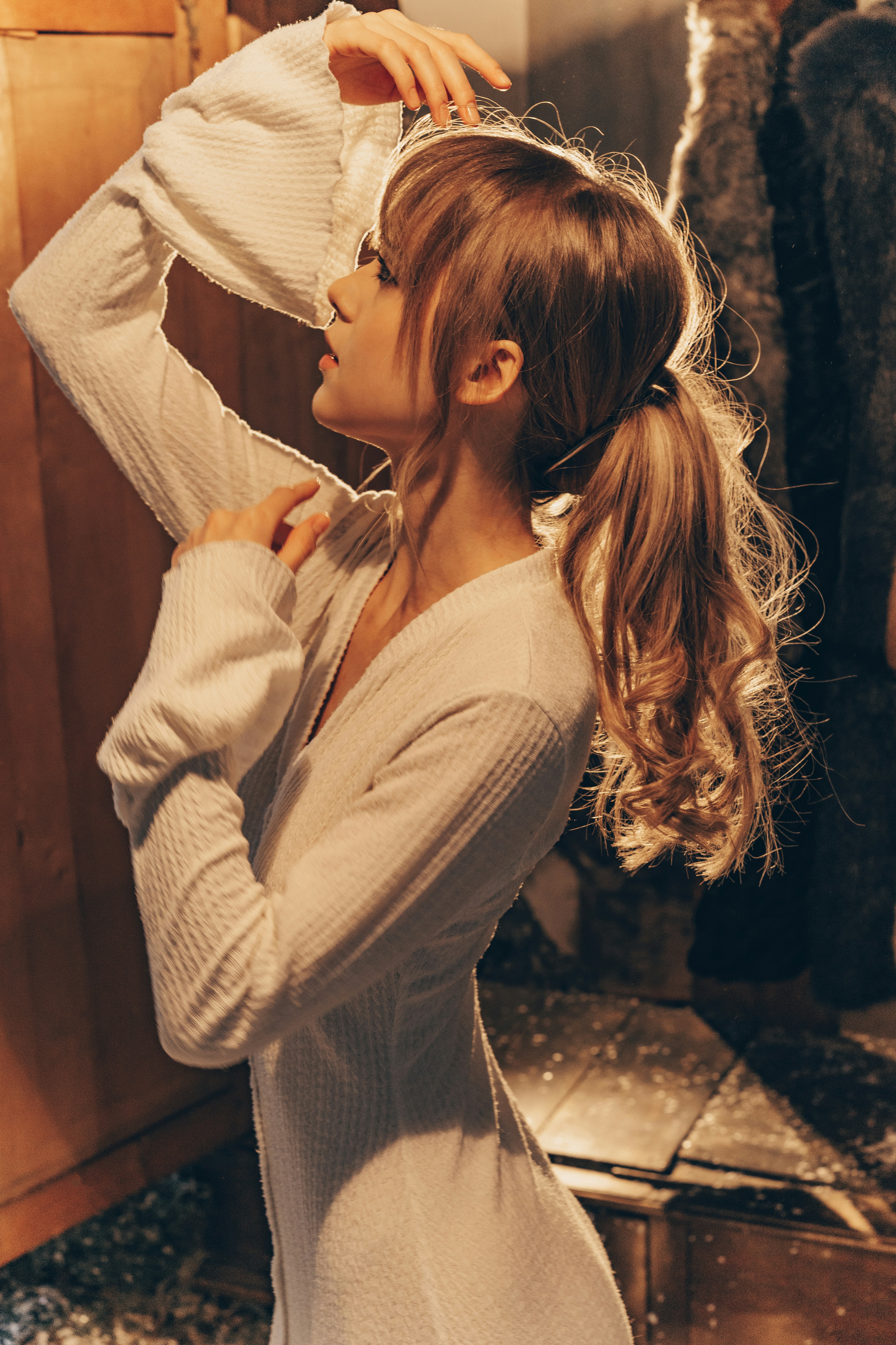 Soft Light and Satin Curls: A Portrait in Warm Wood