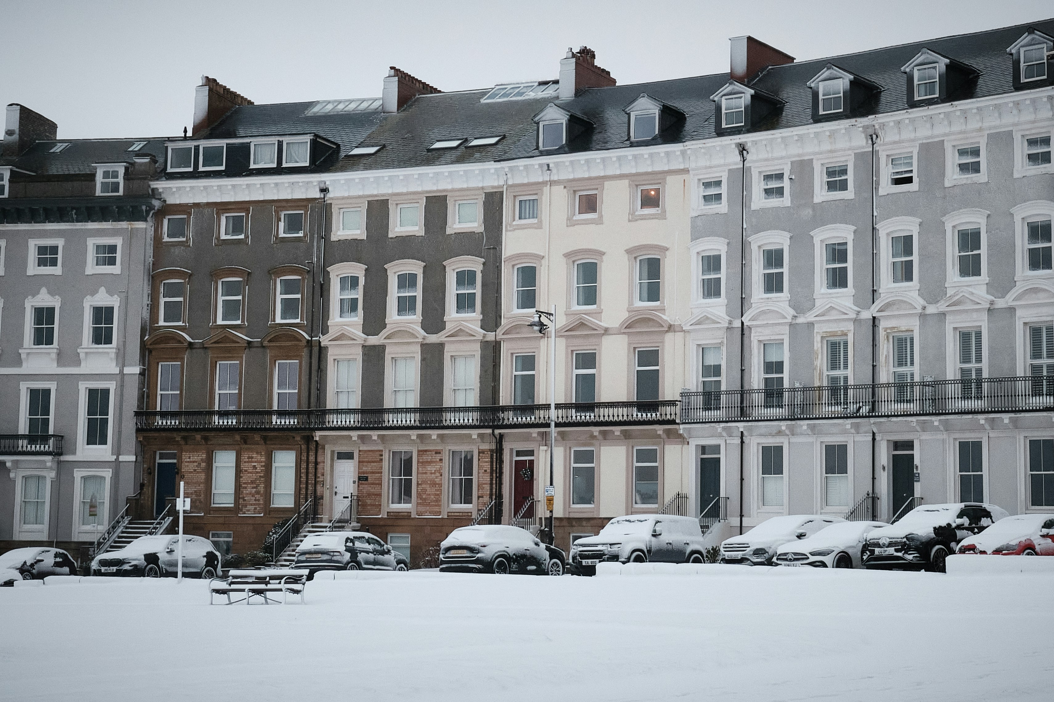 Snowbound Row: Facades and Quiet Street in Winter Light