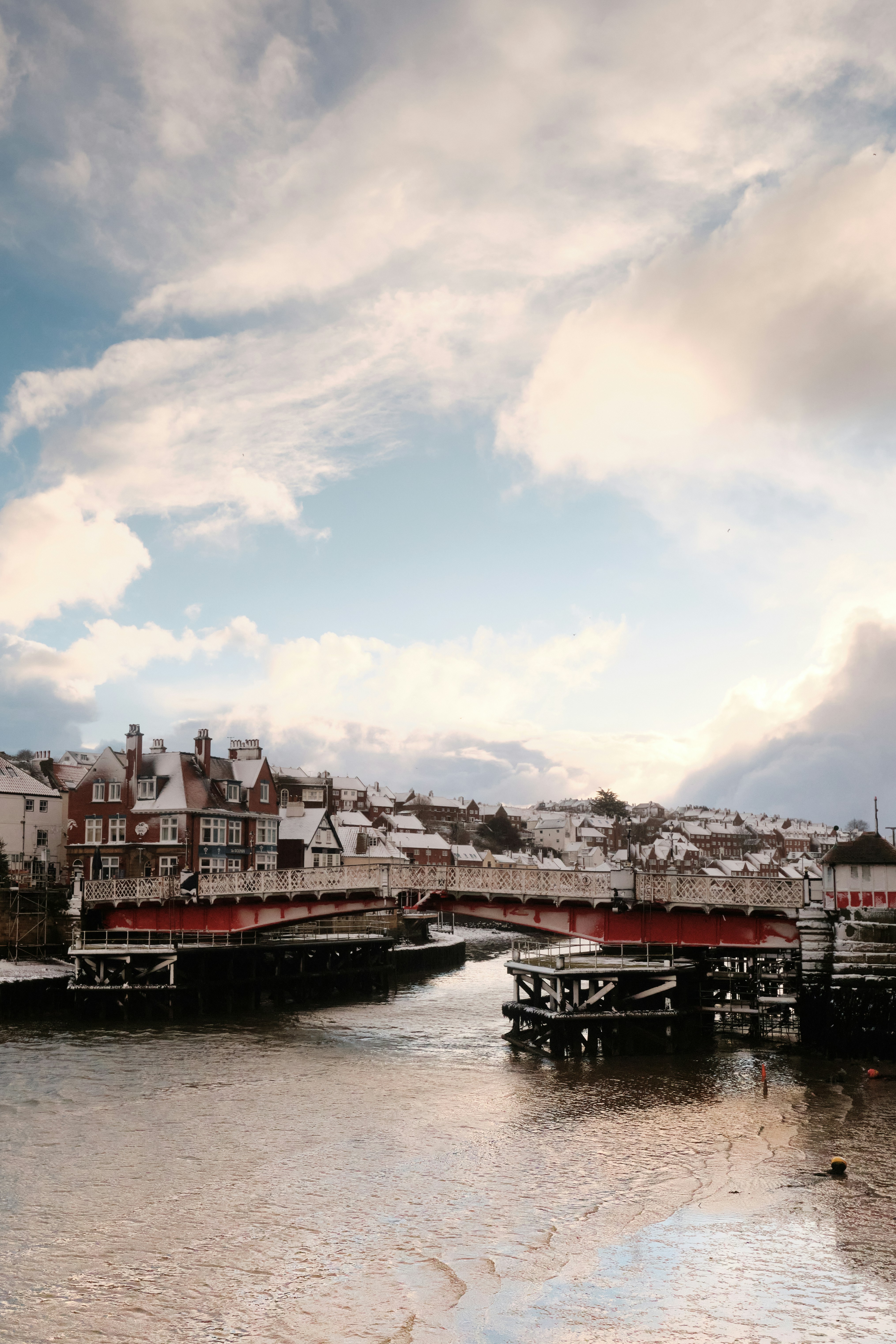 Pastel Harbor: A Quiet Coastal Town Between Bridge and Tide