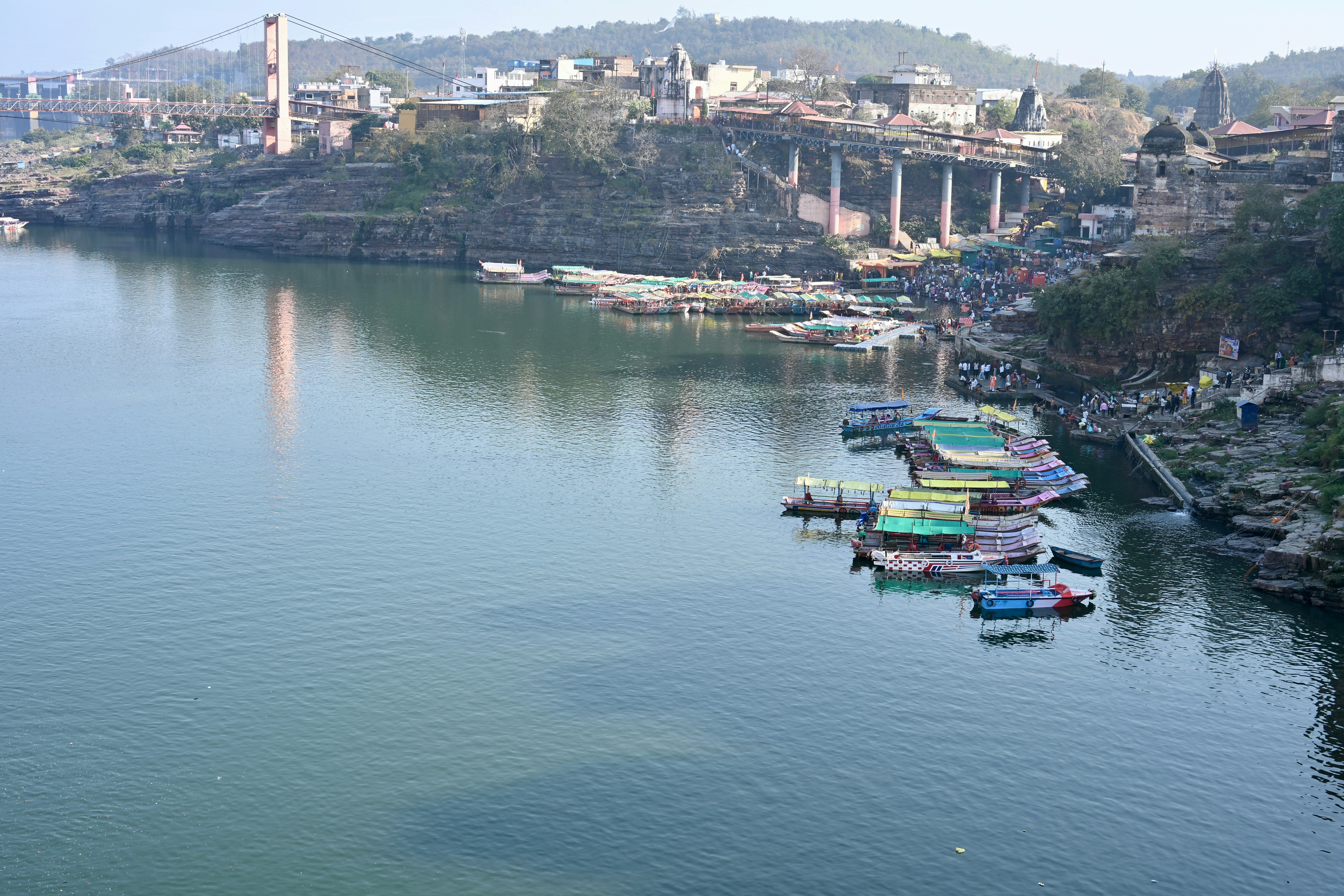 Harbor of Painted Flats: Boats Nestle Along the Riverbank