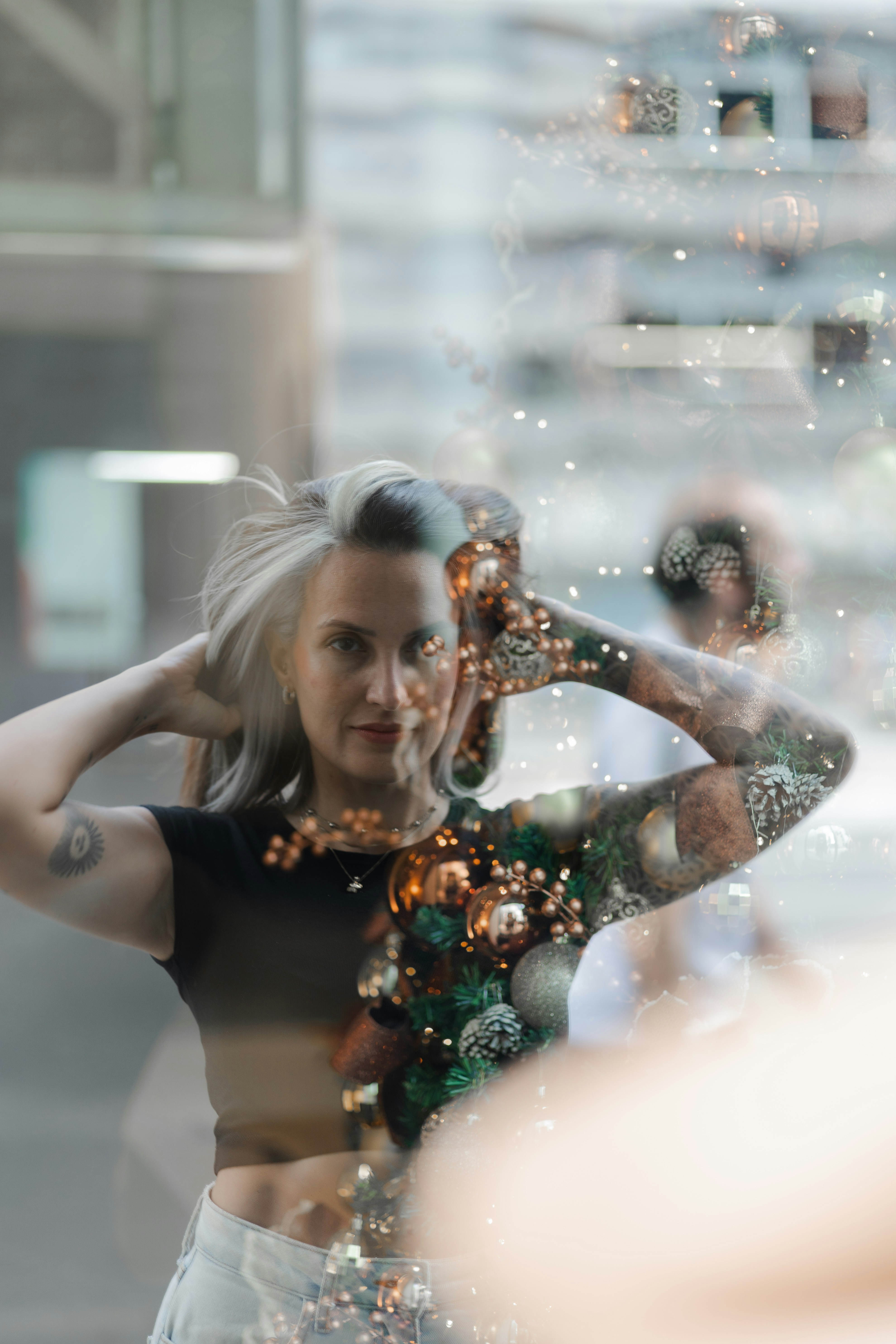 Reflections of a Moment: A Portrait Behind Glass and Glitter