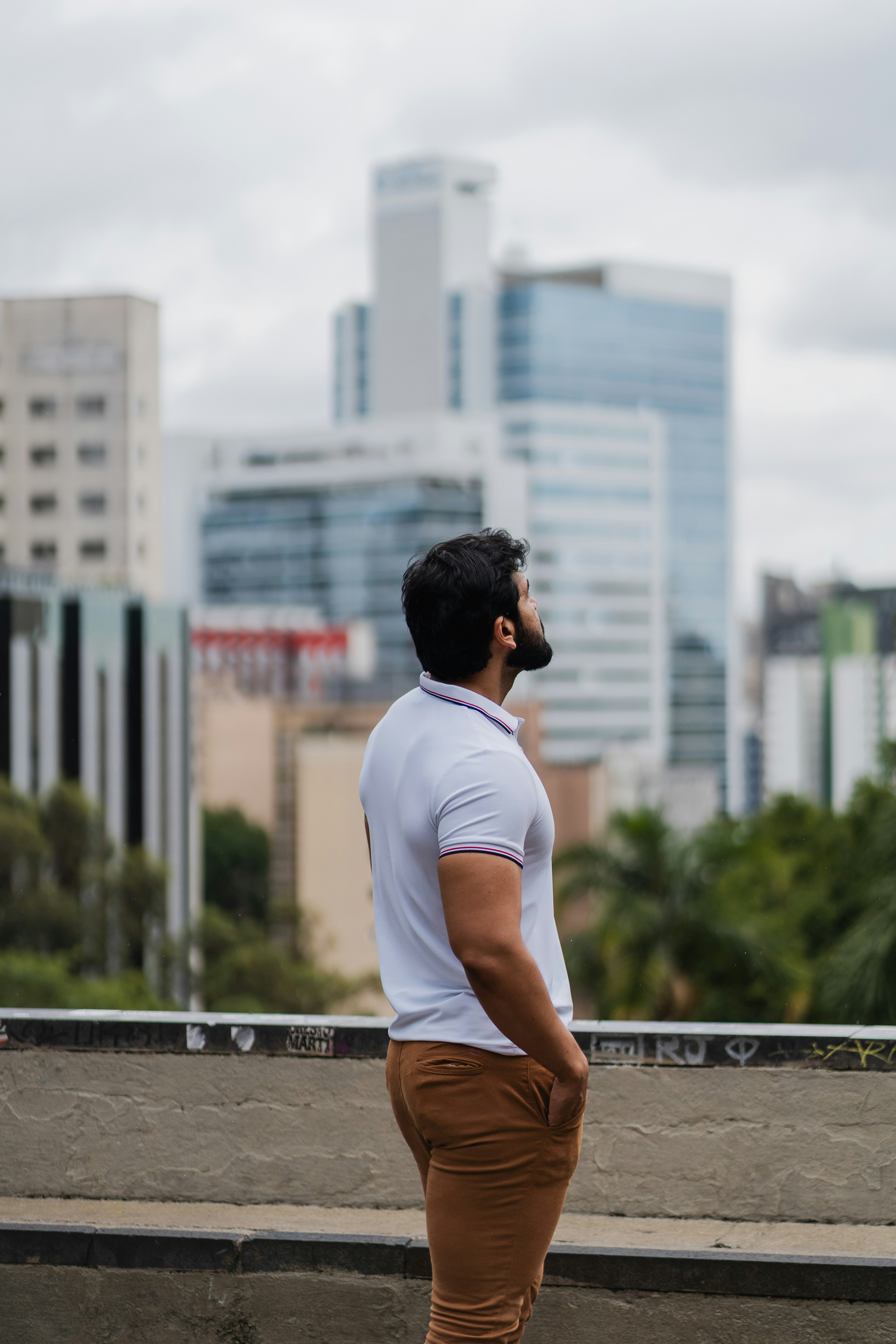 Cityscape Gaze: A Moment of Quiet Over the Rooftop