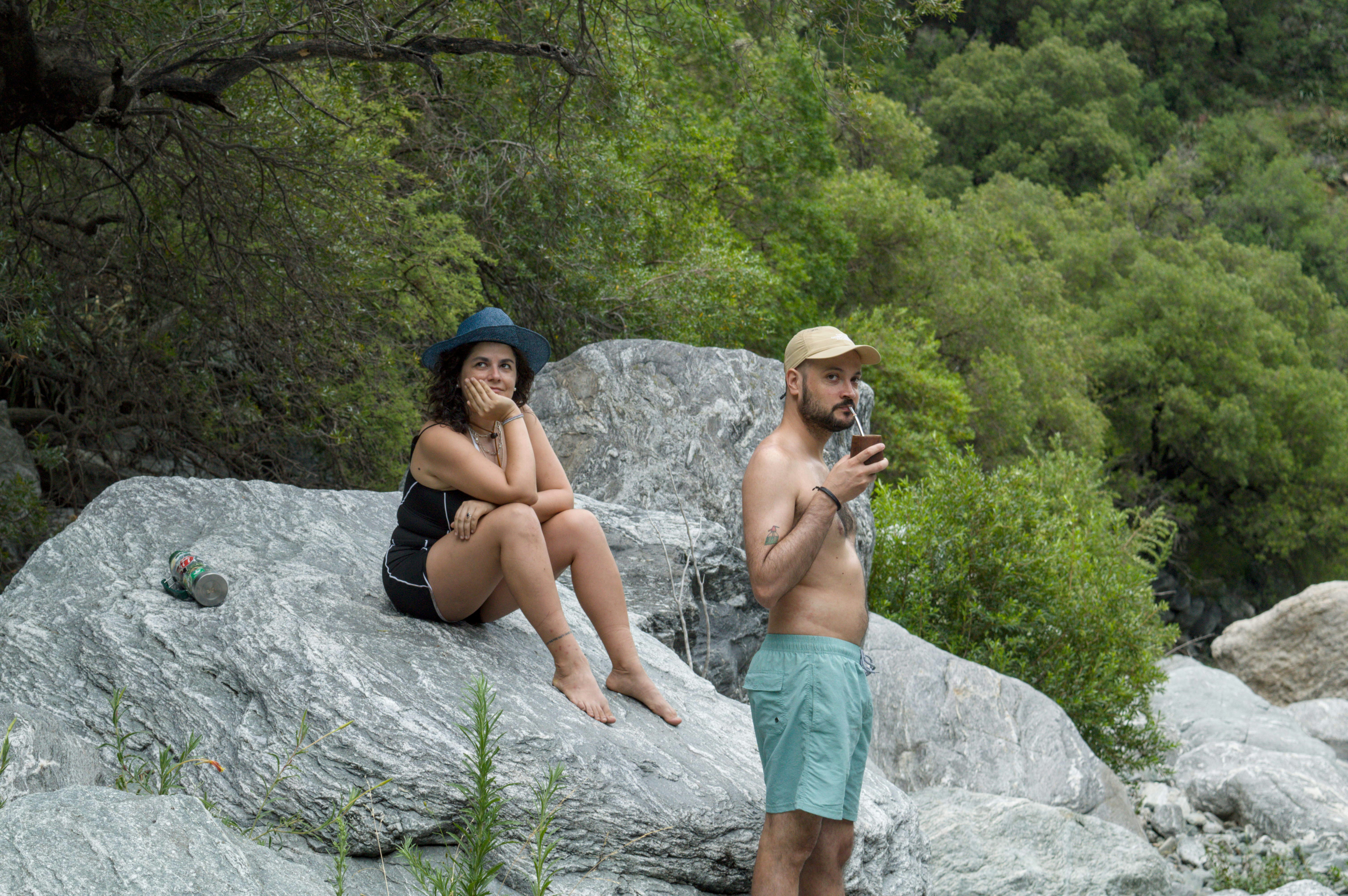 Chillin by the Granite Edge: Vacationers Break on a Quiet Riverside Slab