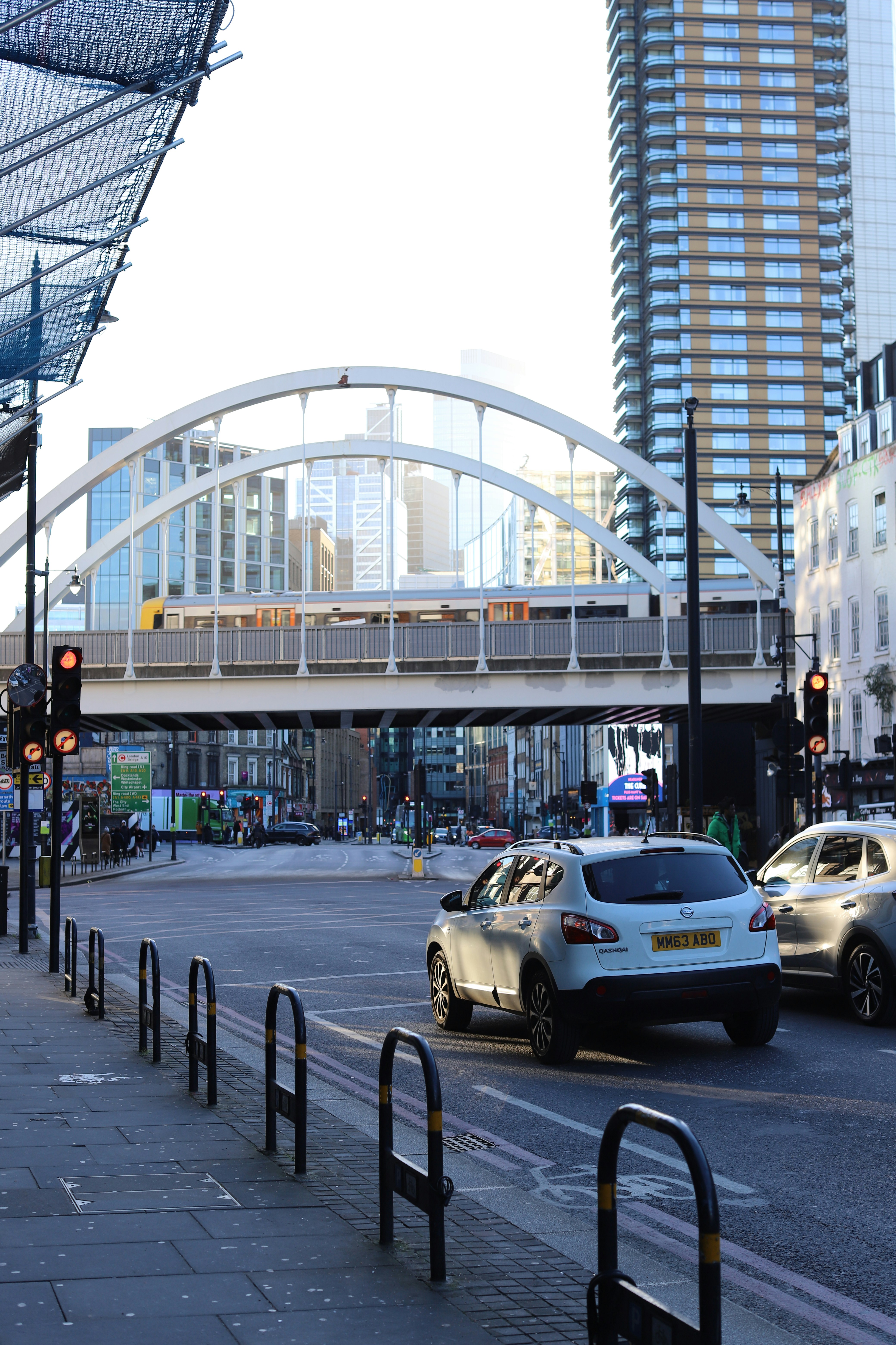 Urban Arc: Cars Under the Archway