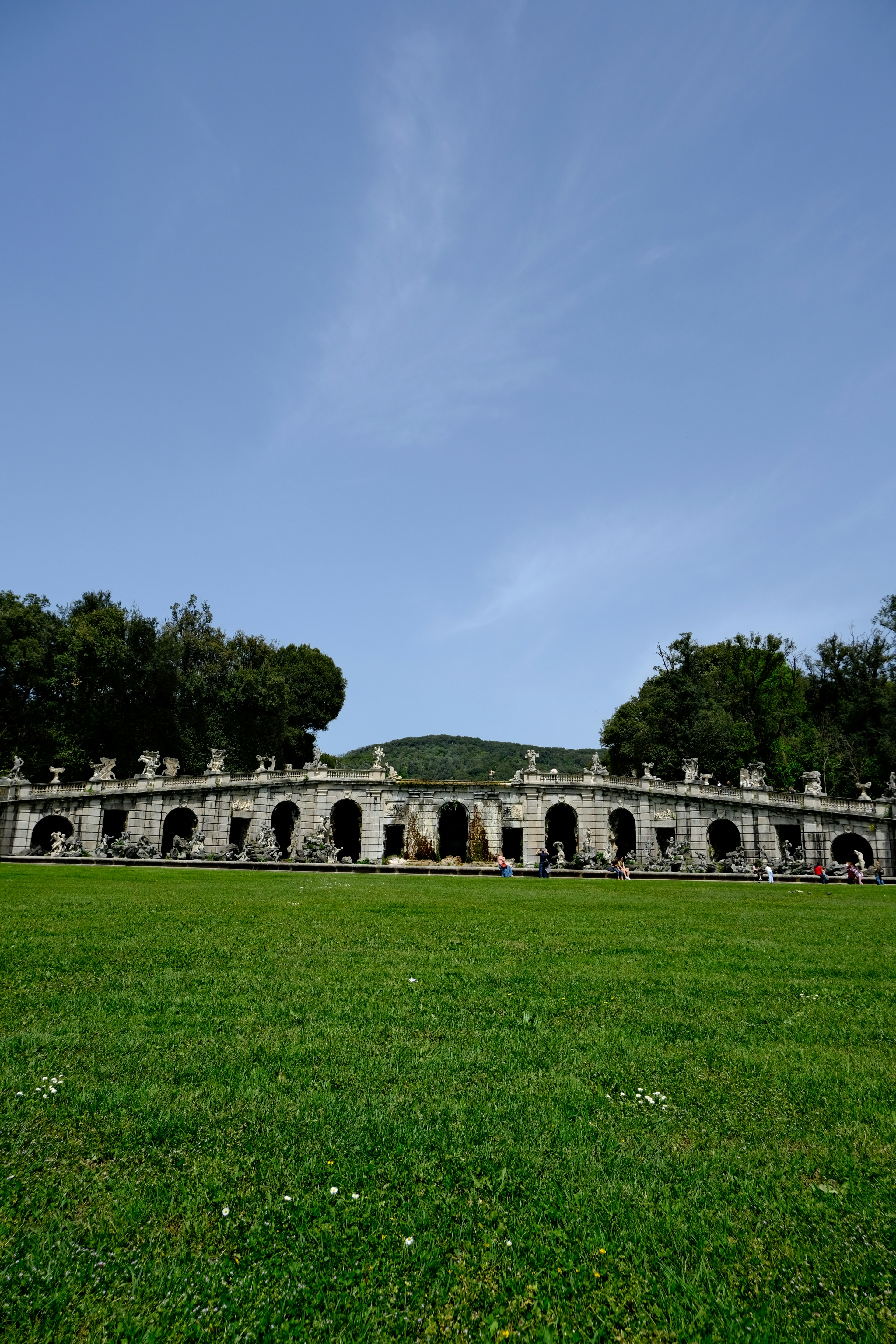 Terraced Arcade Over the Park: Stone Gallery Framing a Green Verge