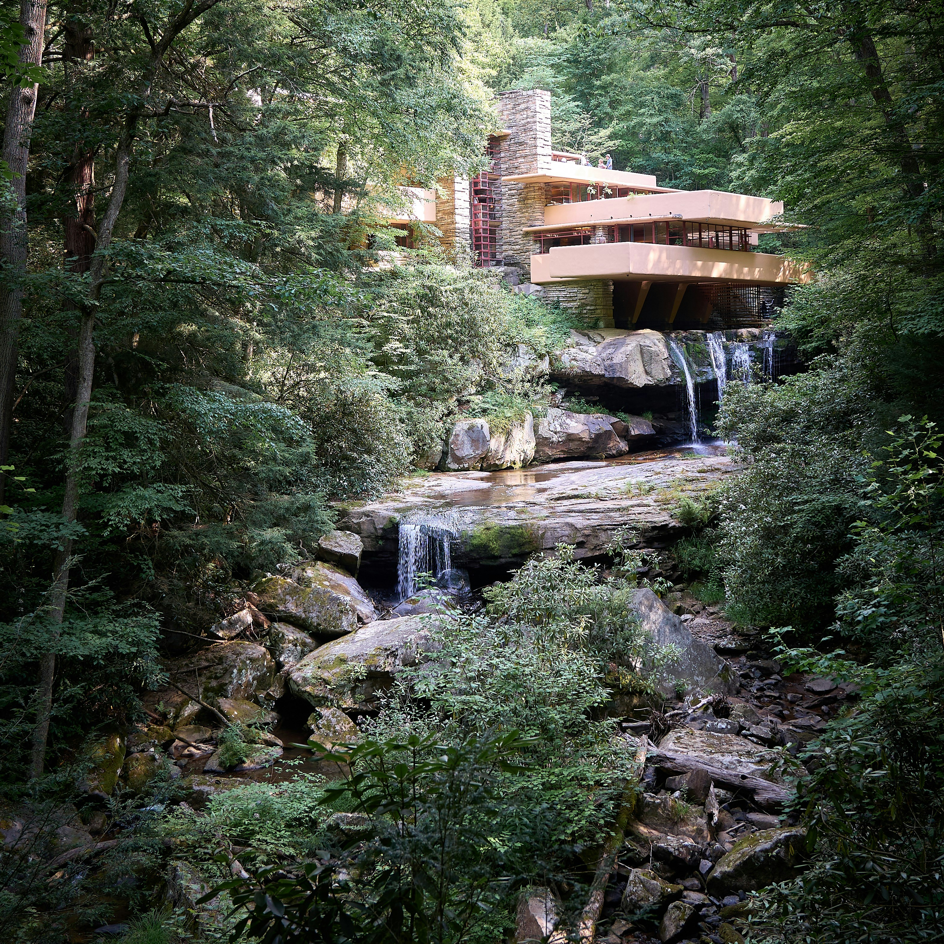 A house built over a waterfall in a forest. photo – Free Building Image ...