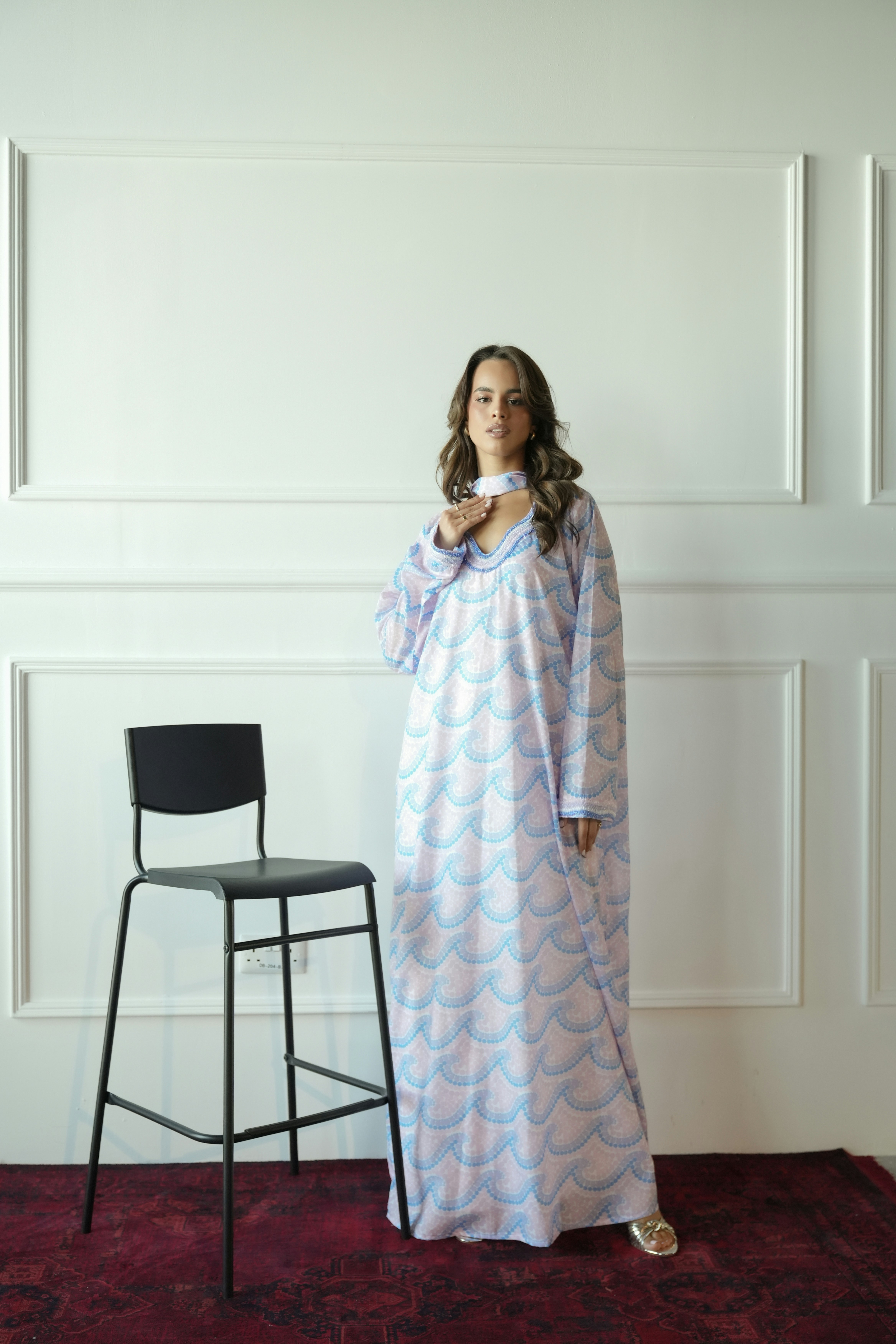 Graceful Exhibition: Woman in Pastel Wave Dress by Minimal White Panels