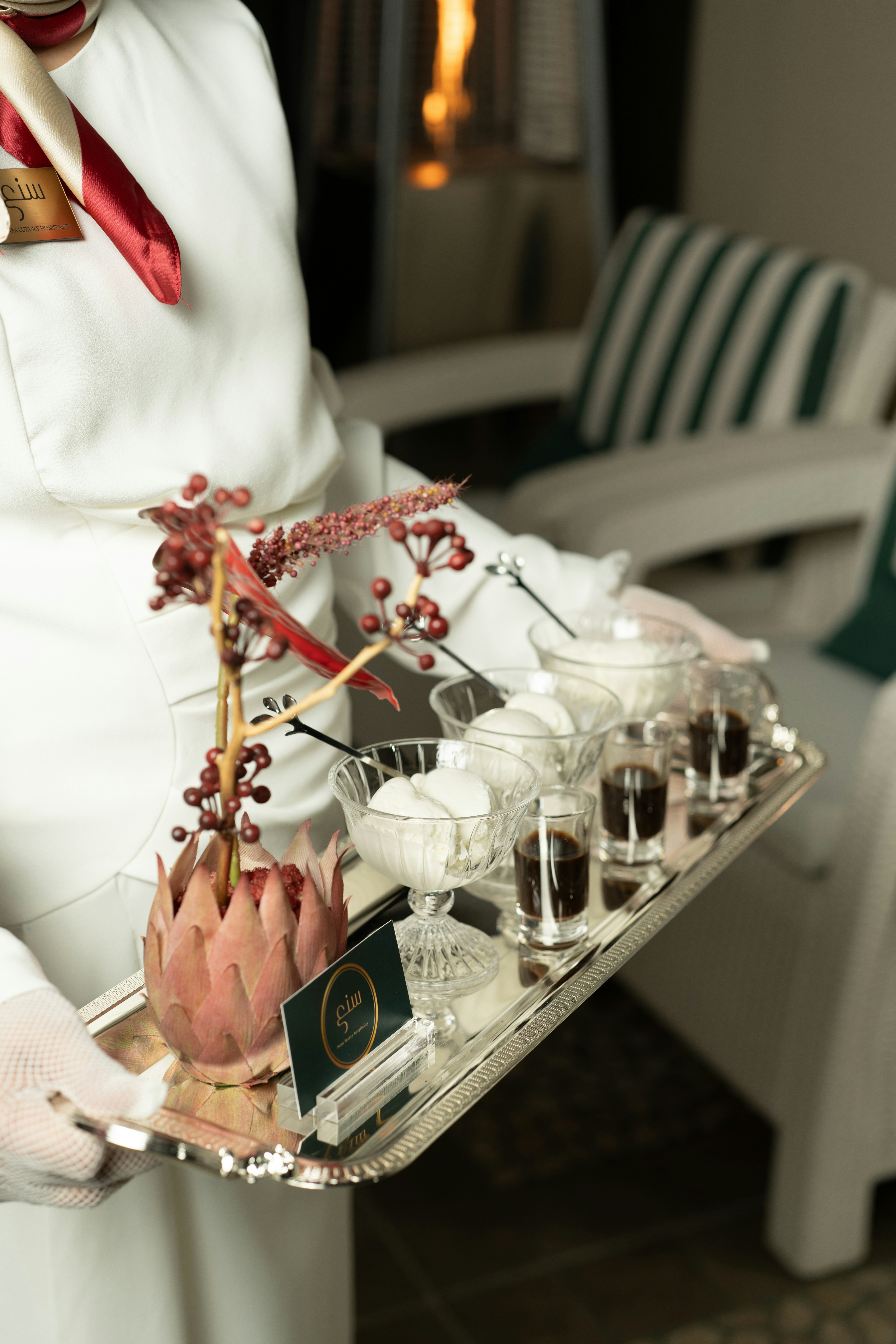 Serving Elegance: A Baronial Tray of Desserts in a Quiet Lounge