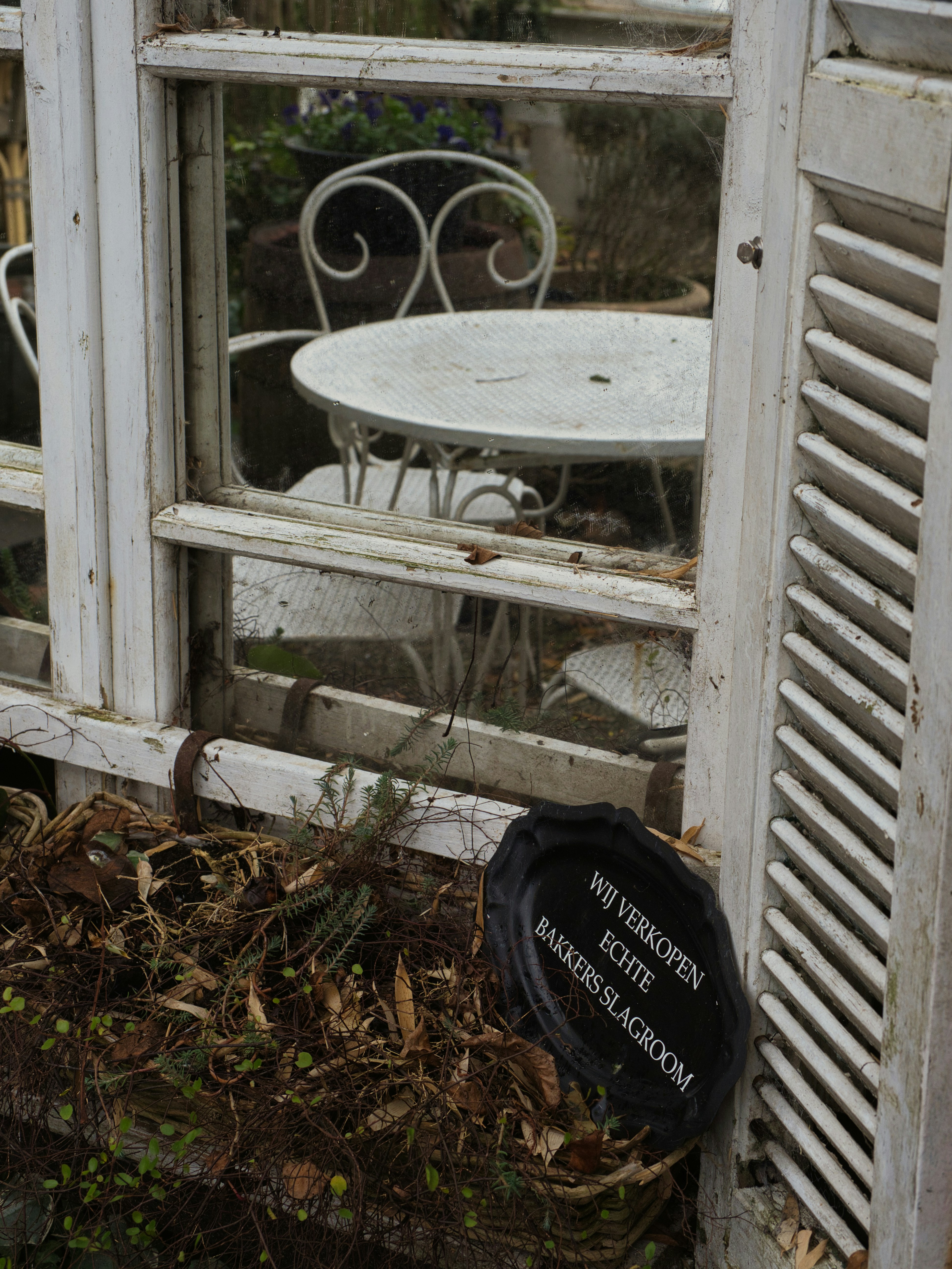 Rust and Glass: A Quiet Corner by the Garden Window