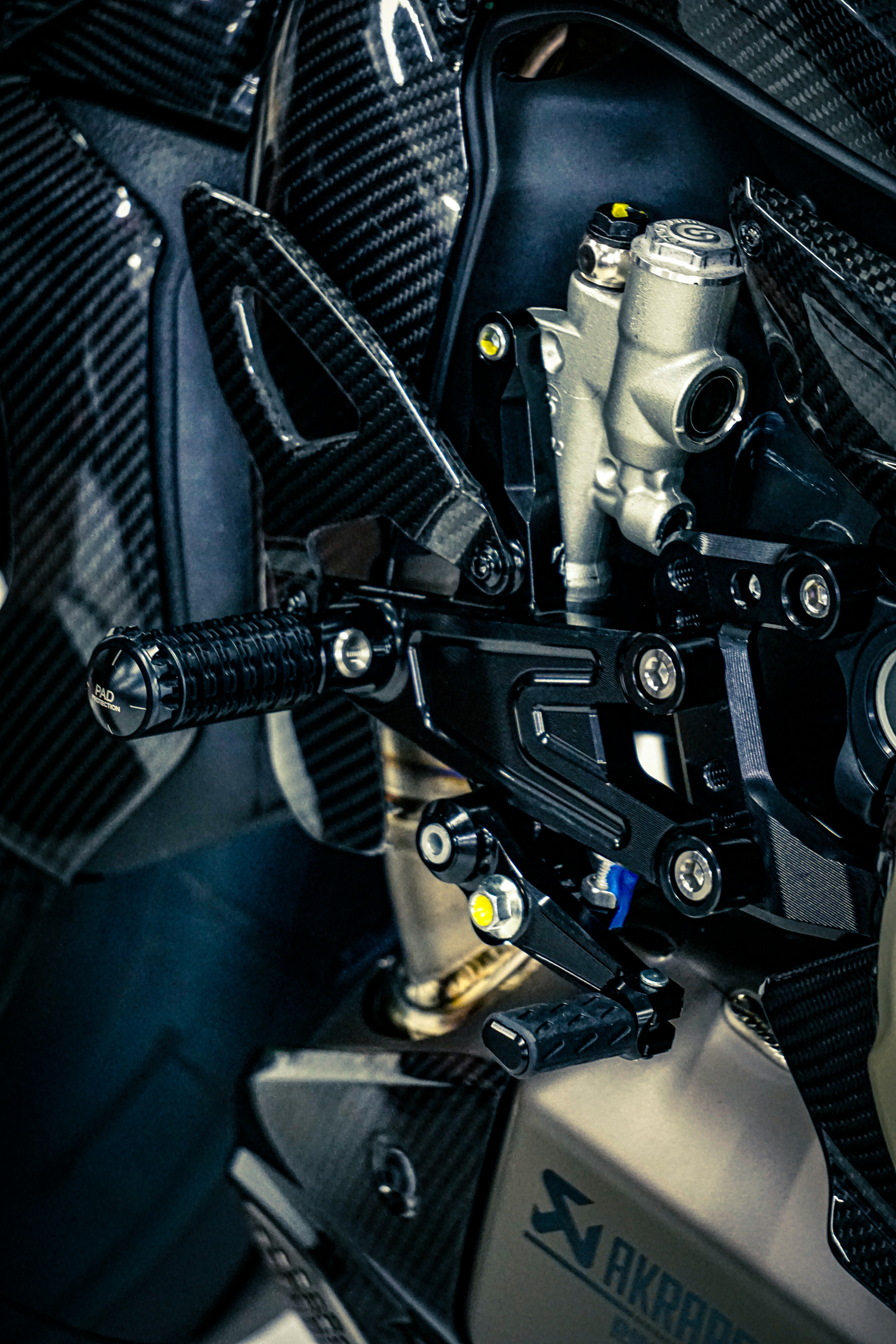 Precision in Motion: Close-Up of a Racing Motorcycle's Hydraulic Master Cylinder