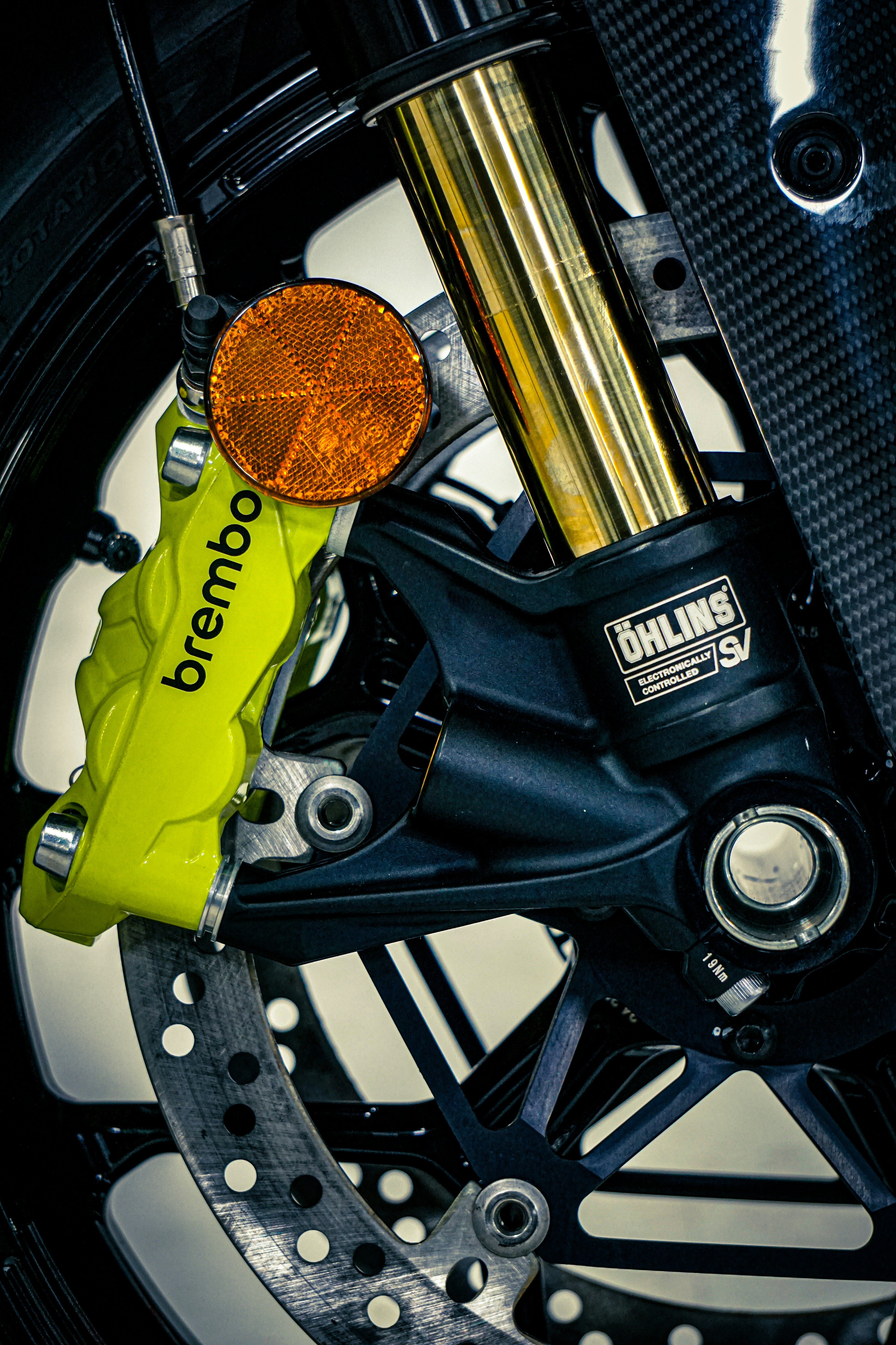 Vibrant Brembo Caliper Highlight on a Racing Front Wheel