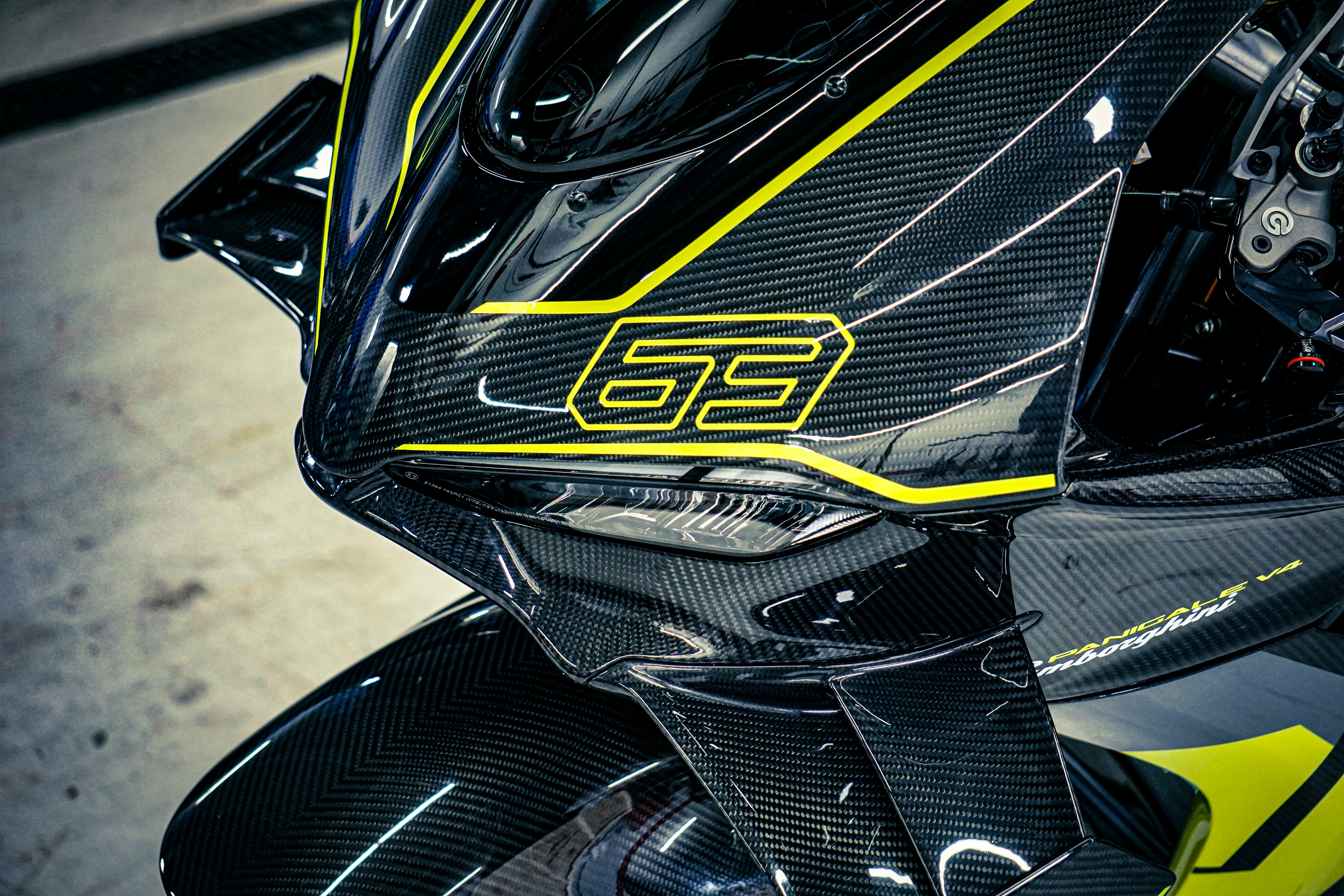Carbon-weave Focus: Detail of a racing carbon-fiber Prima atop a neon-accented front fairing