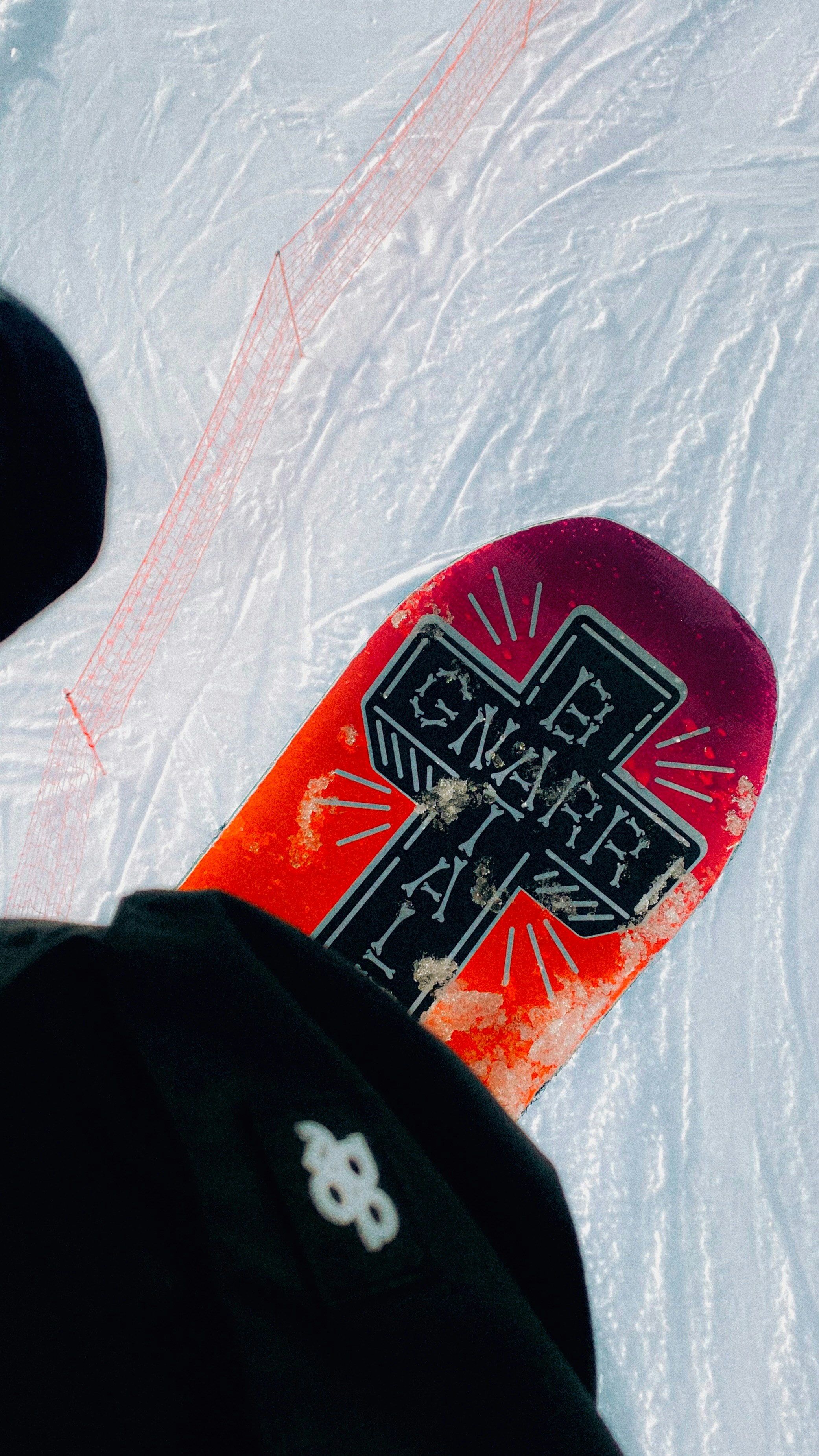 Snowboard Down the Ridge: Red Crossboard in a White World