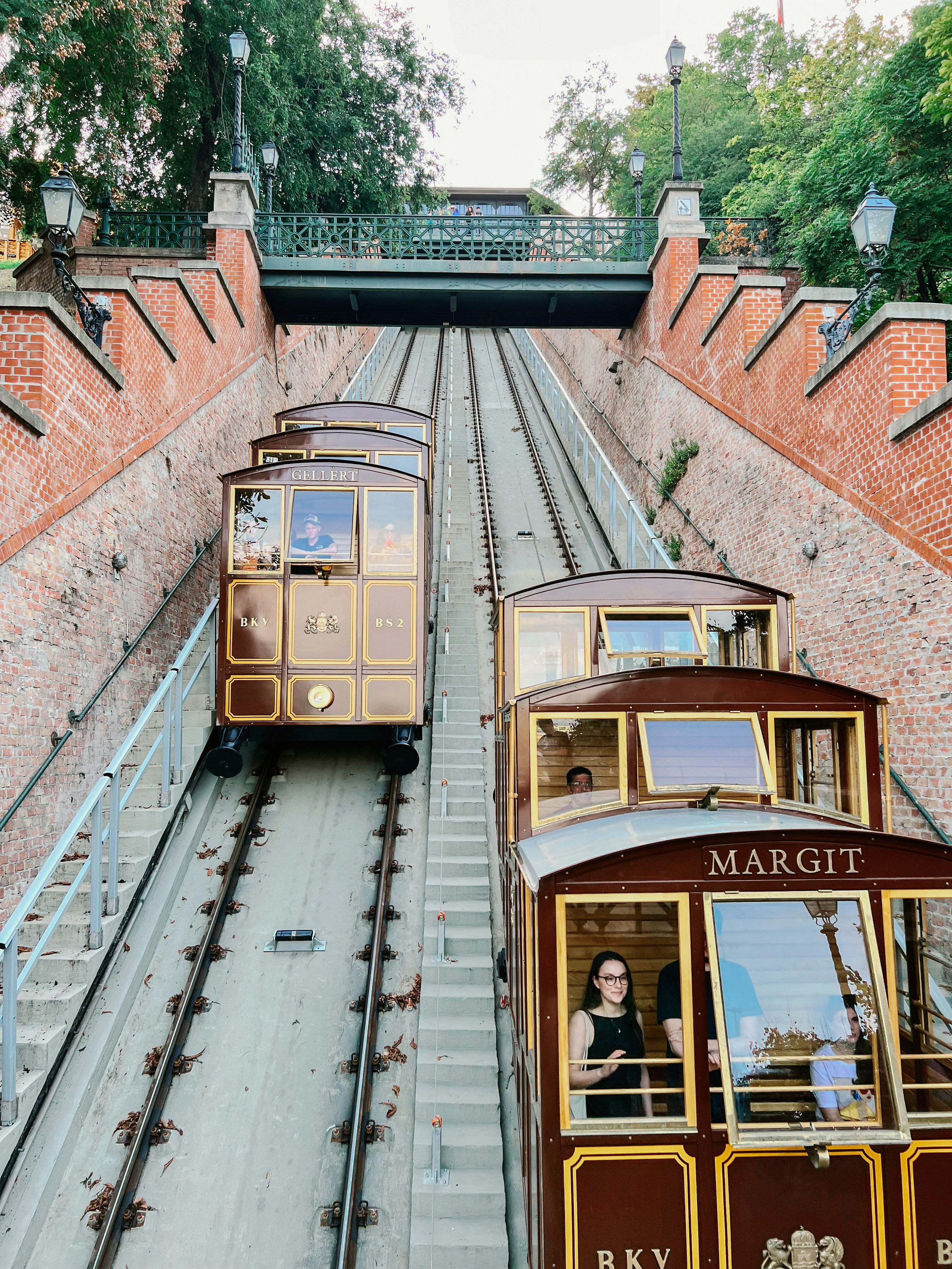 Funicular Portrait: Riders in a Historic Turin-like Tram Cascade