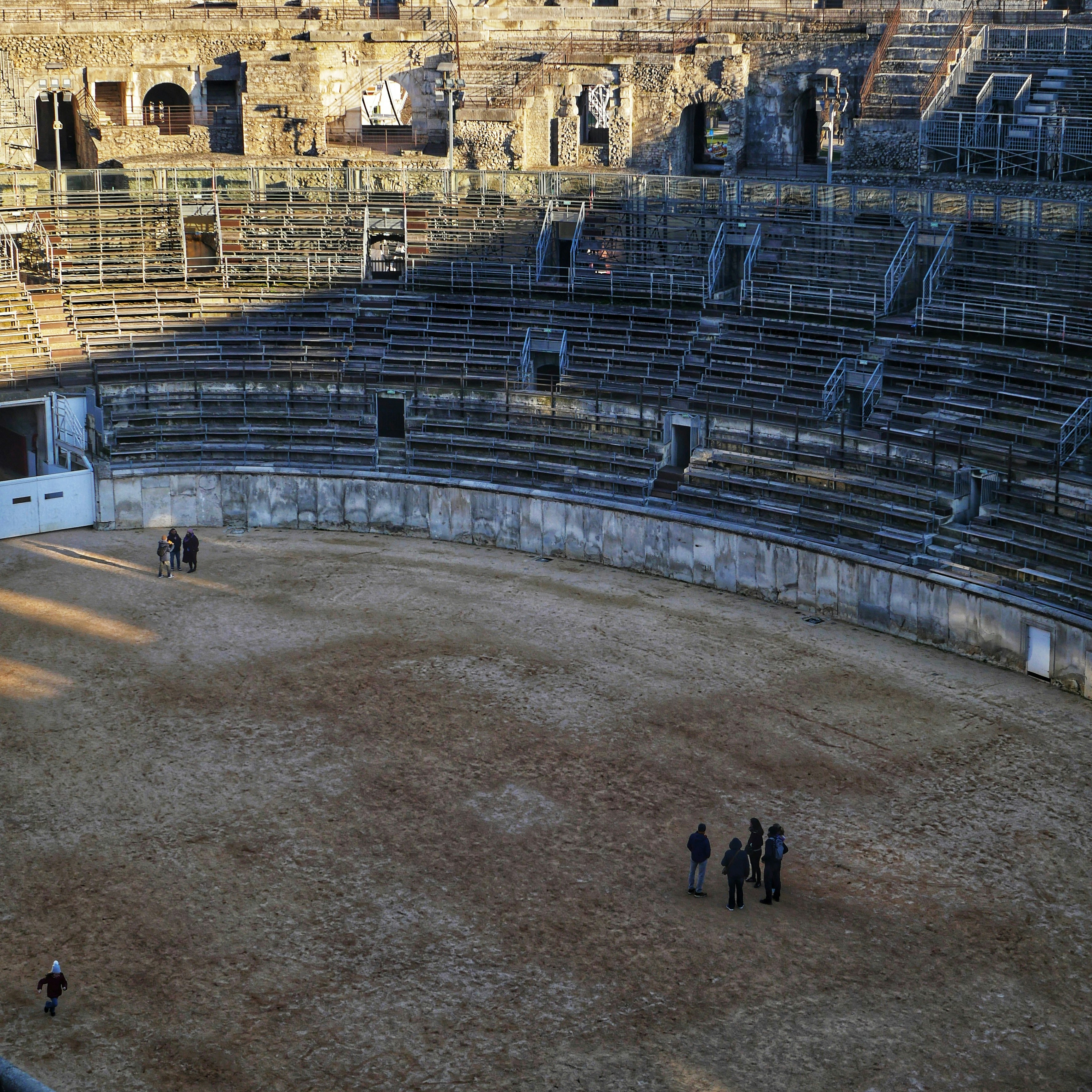 Whispers of the Arena: A Quiet Circle Under The Arcaded Sky