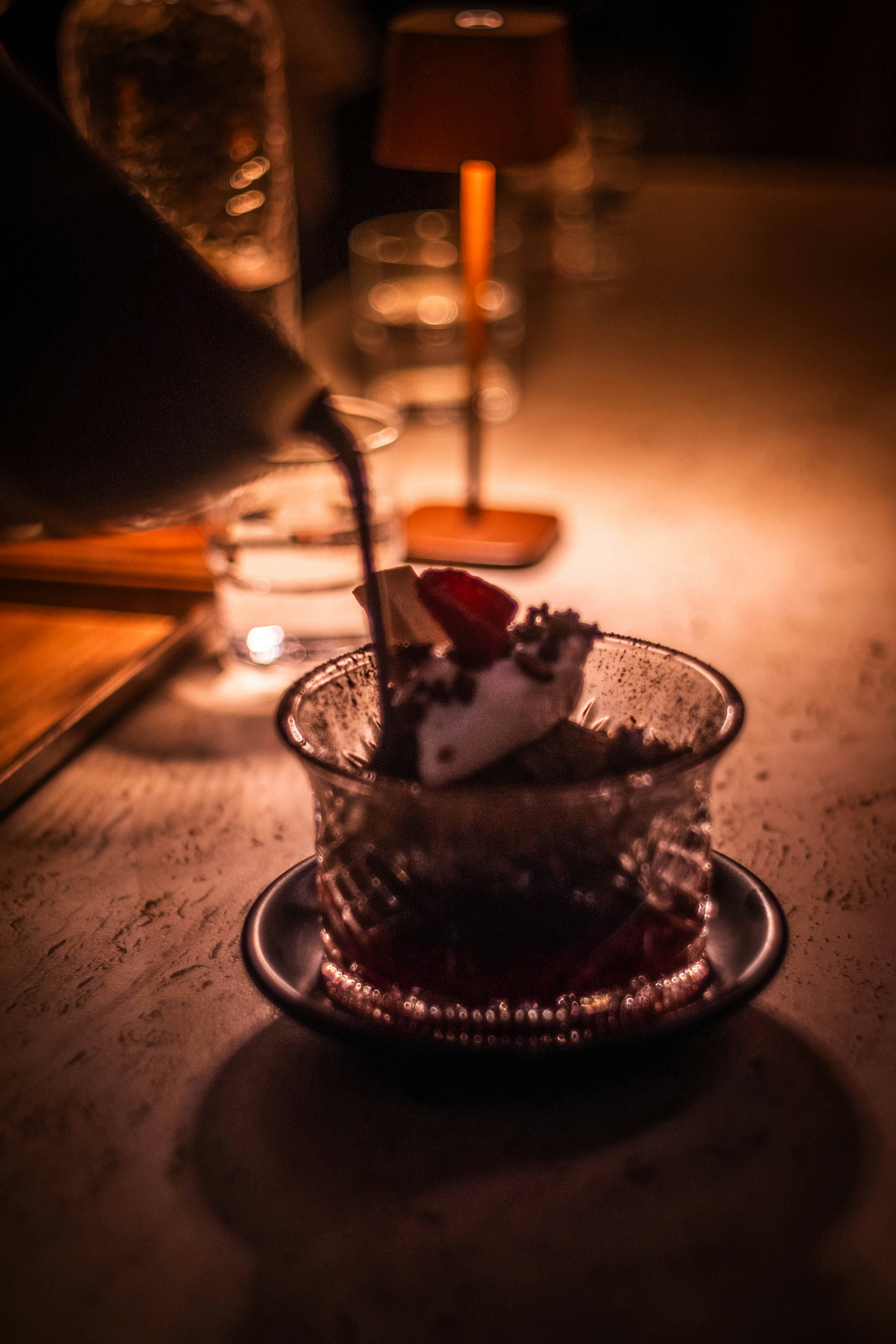 Amber-tinted indulgence: a velvet cocktail in a glimmering glass