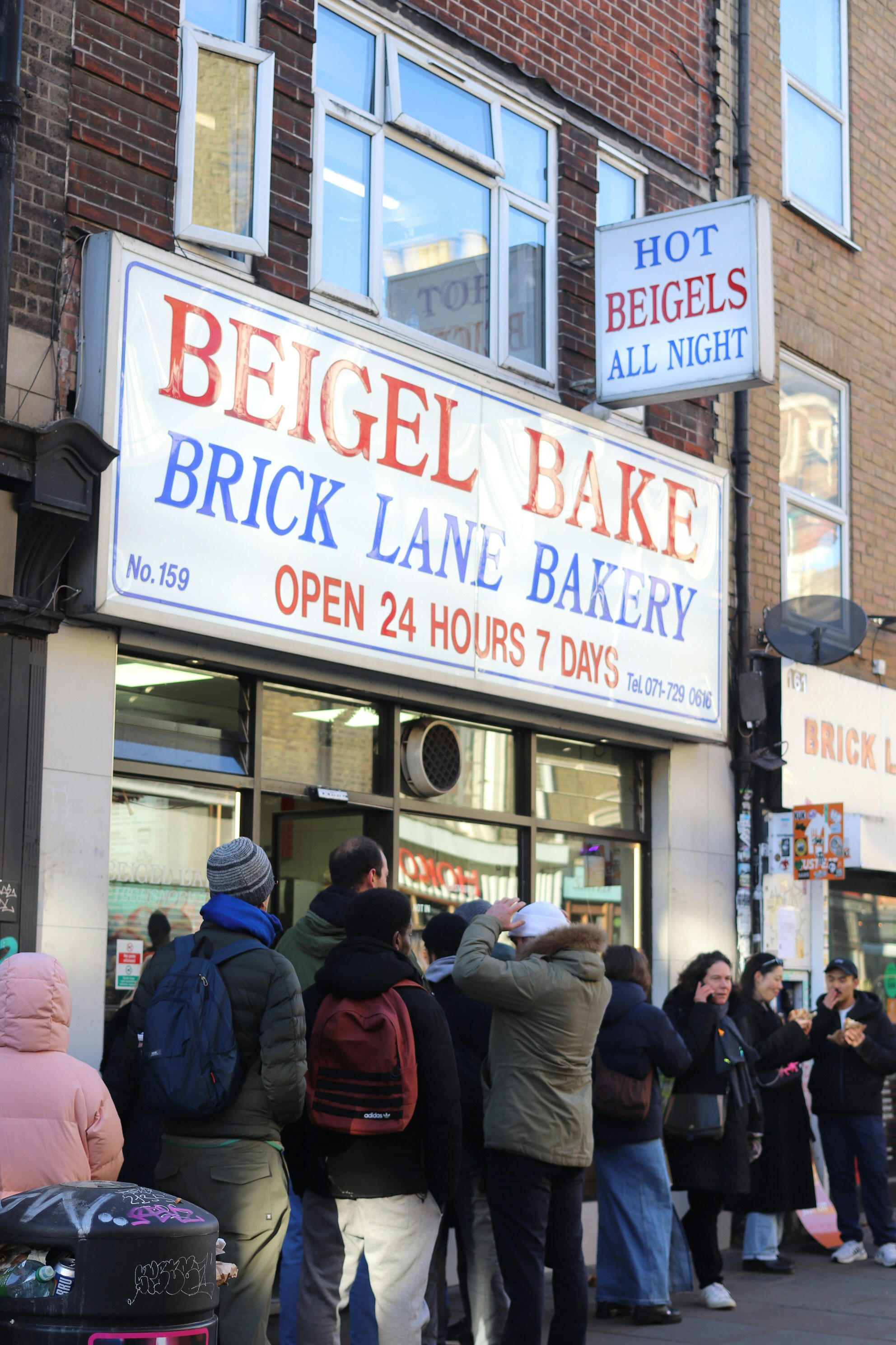 People queuing outside beigel bake brick lane bakery