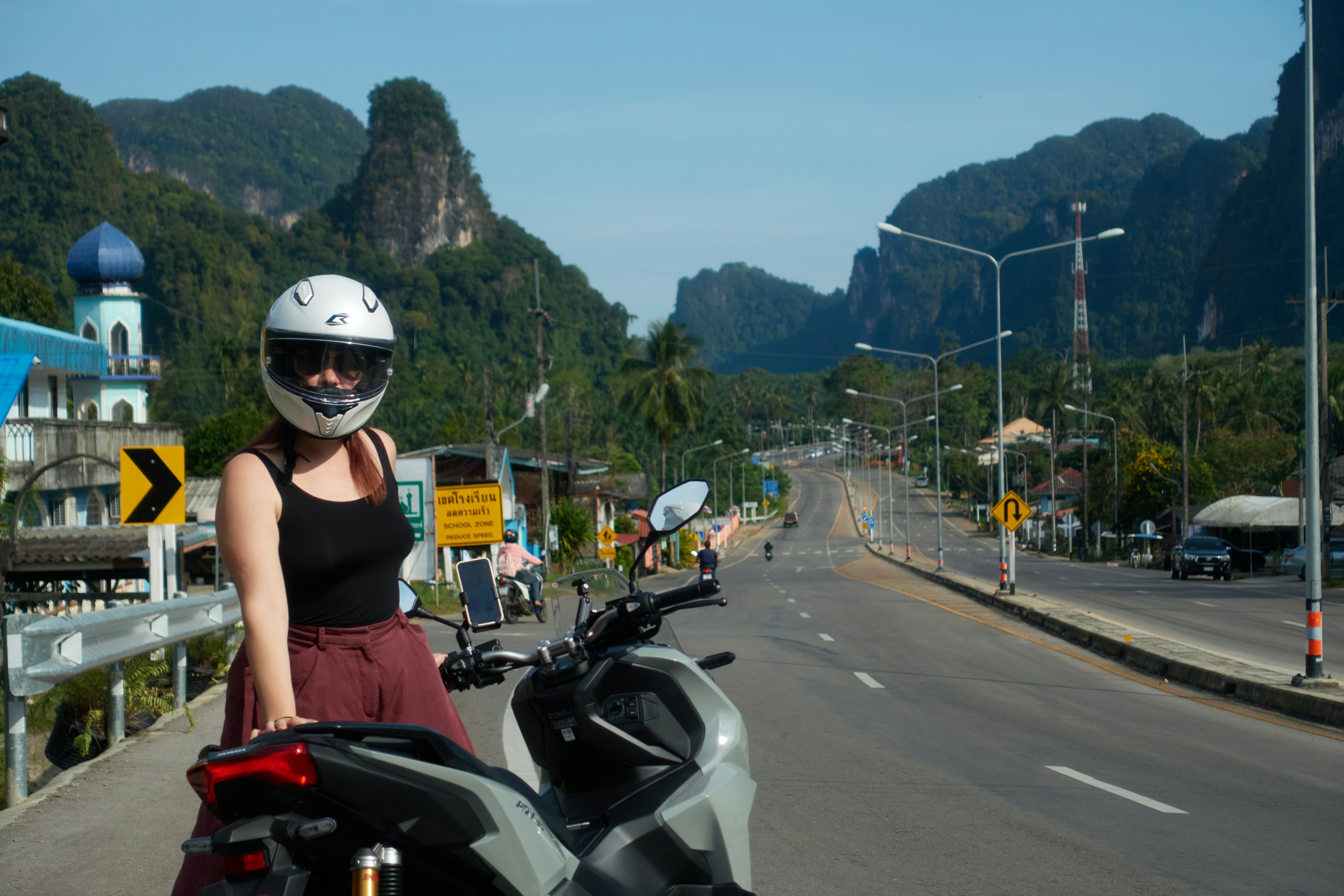 Motorcycle Rider at a Scenic Coastal Road