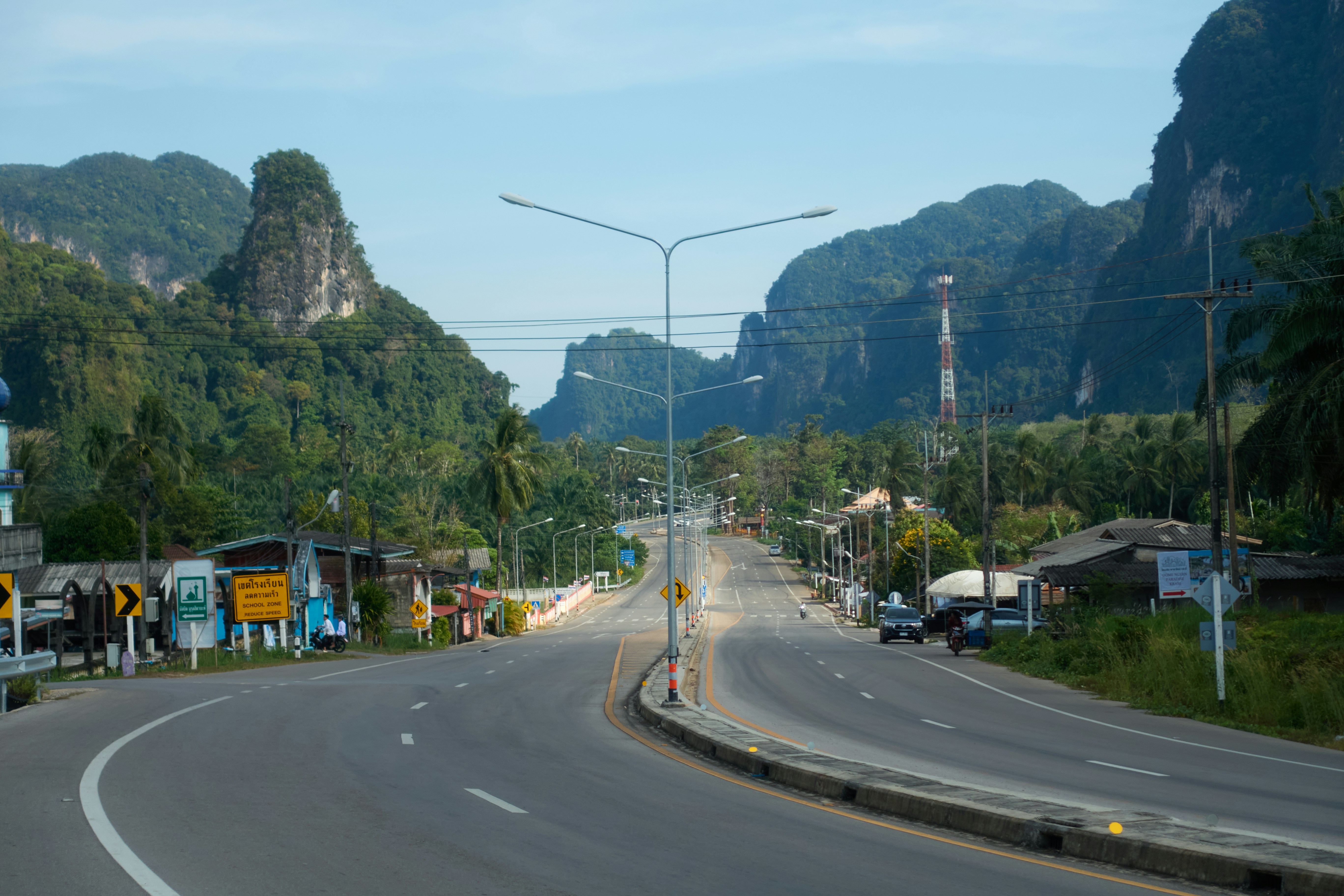 A Quiet Spine of Road Ahead Through Karst-like Hills